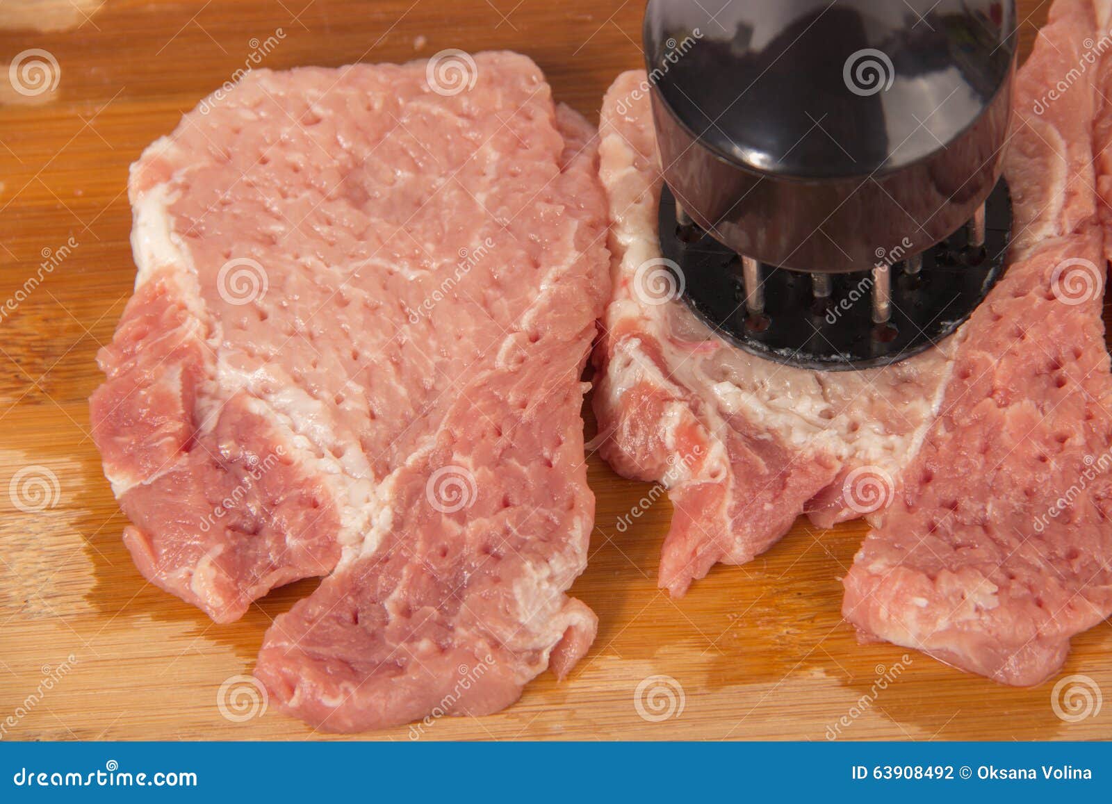 Beat the Meat on a Wooden Board on a White Background Stock Photo ...