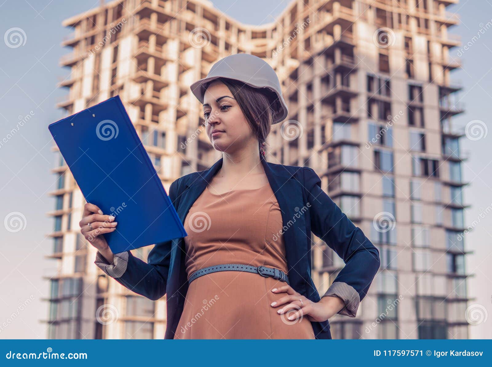 Beatiful Business Woman Engineer is Standing with Plan Papers. Stock ...