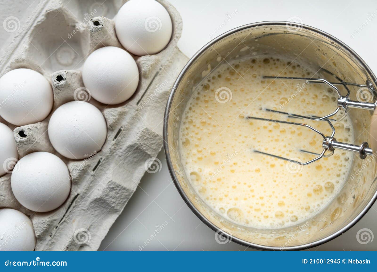 Beating Eggs with Milk with a Mixer. Cooking an Omelet Stock Image ...