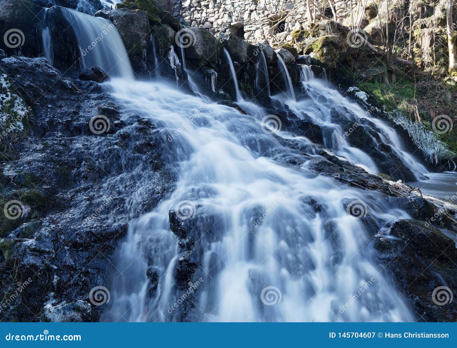 Beautful Waterfall and an Old Mill in the Swedish Village Rottle during ...