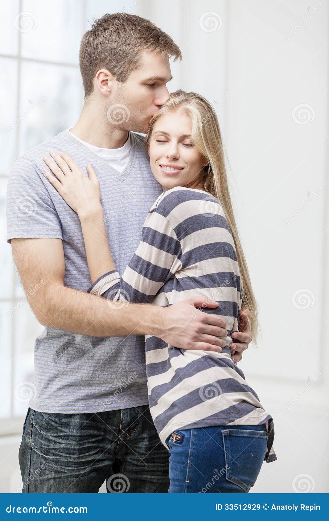 Beautibul Young Couple Huging Indoors Stock Image - Image of happiness ...