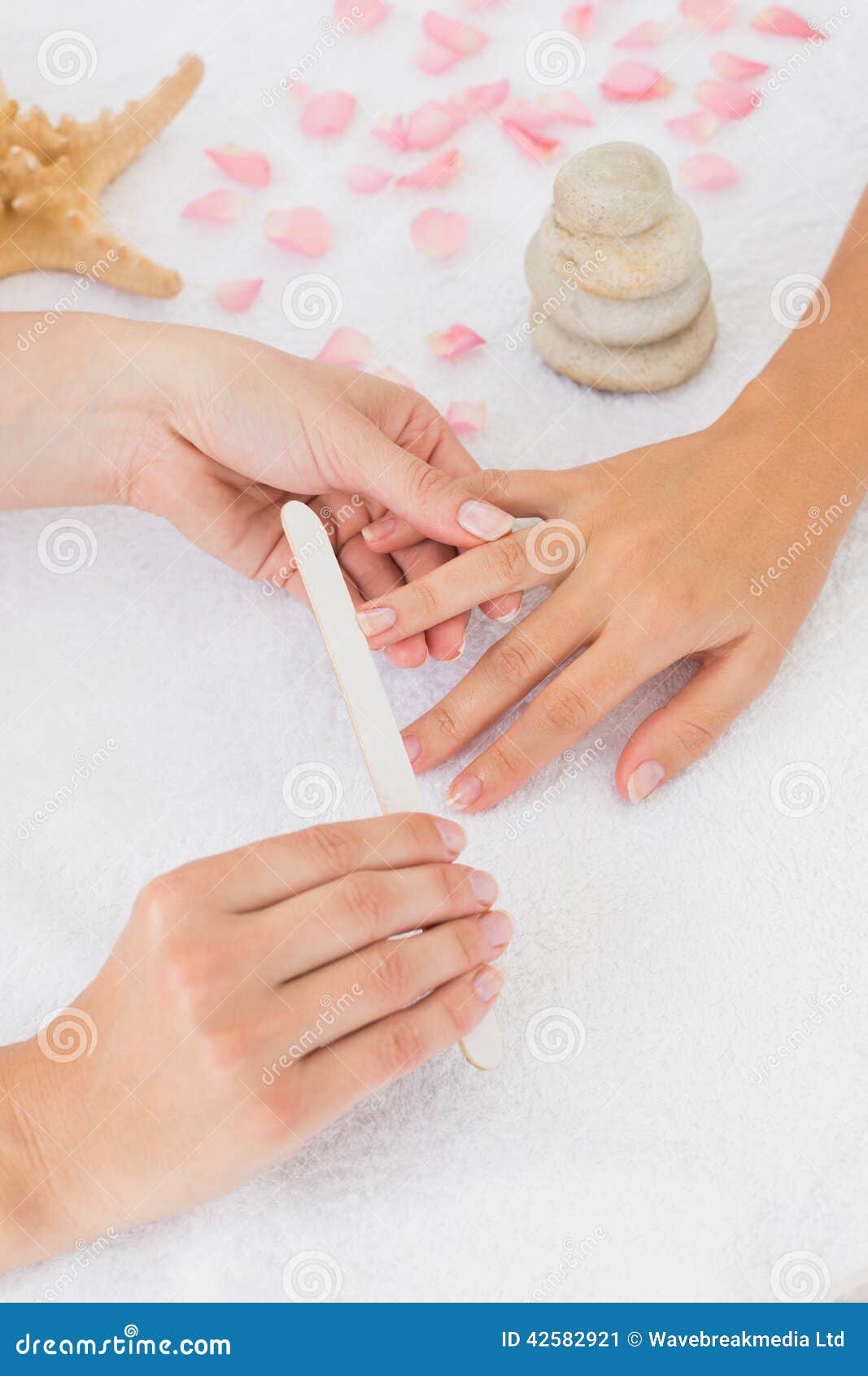 Beautician Filing Female Client S Nails At Spa Beauty Salon Stock Image