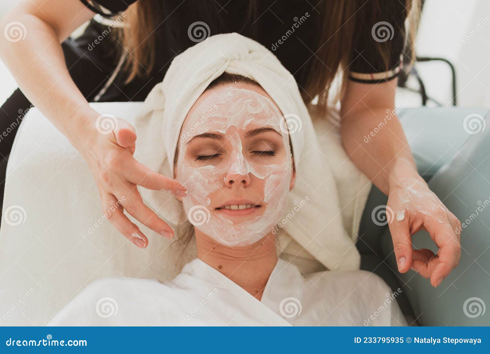 Beautician Makes Facial And Massage To Adorable Young Woman With A
