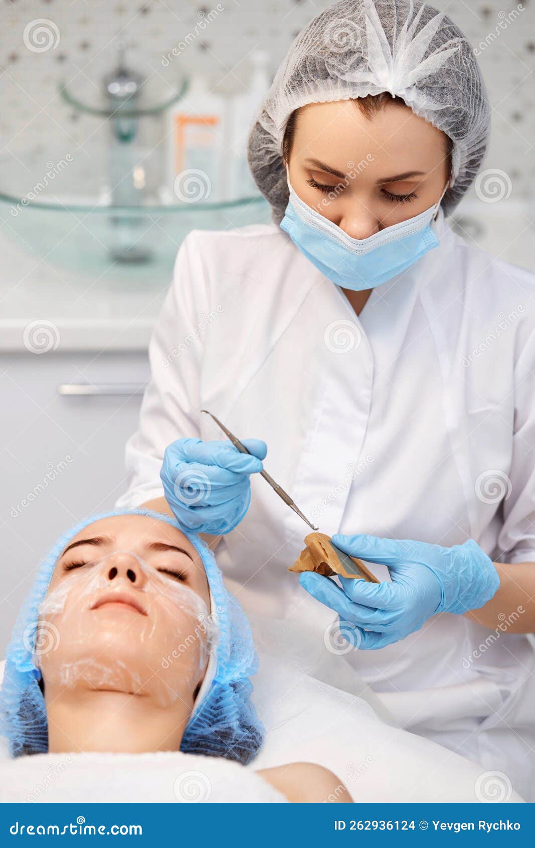 Beautician Opens a Package with Sterilized Instruments Stock Photo ...