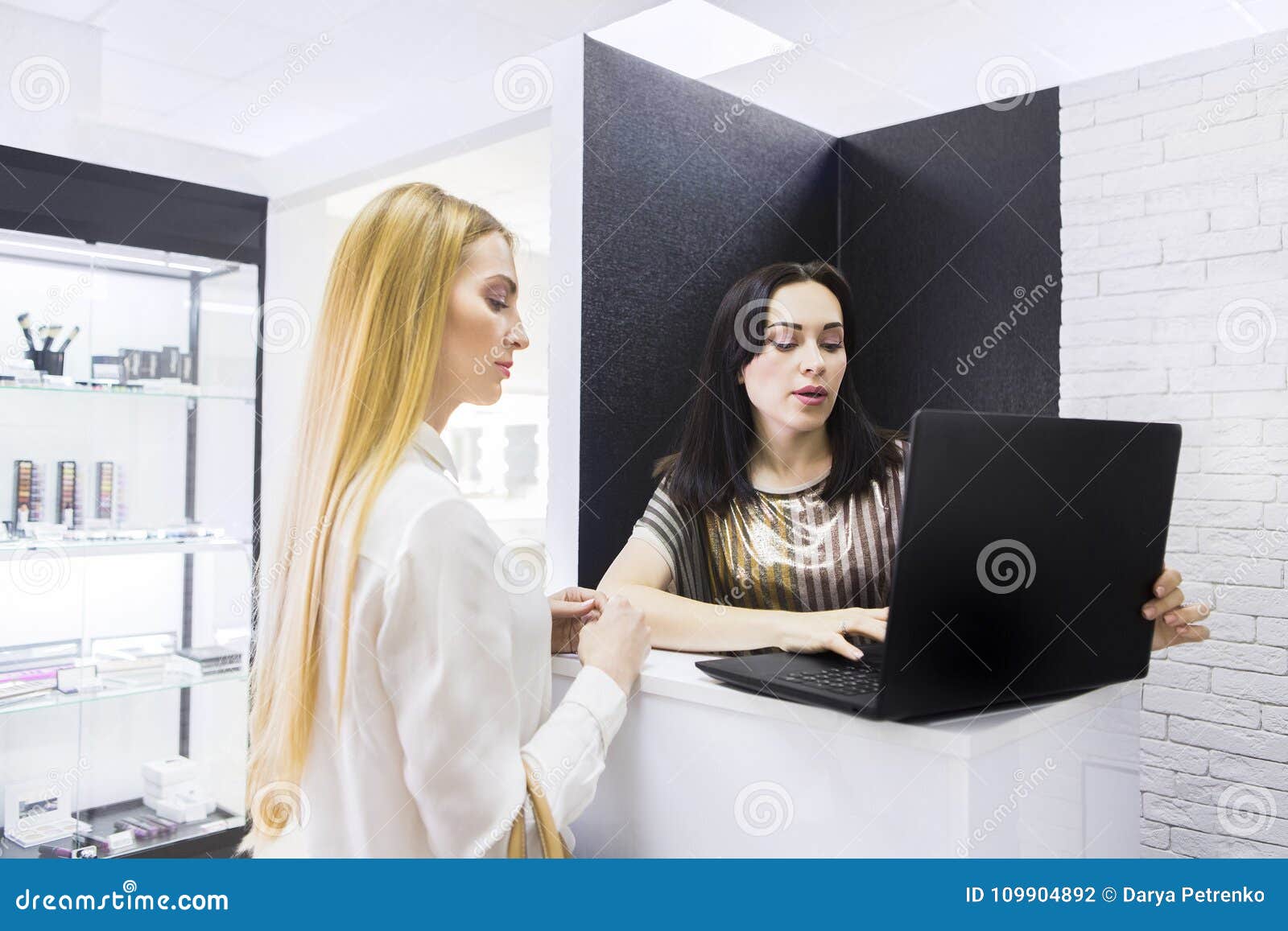 Beautician Talking with Client at the Beauty Salon Stock Photo - Image ...