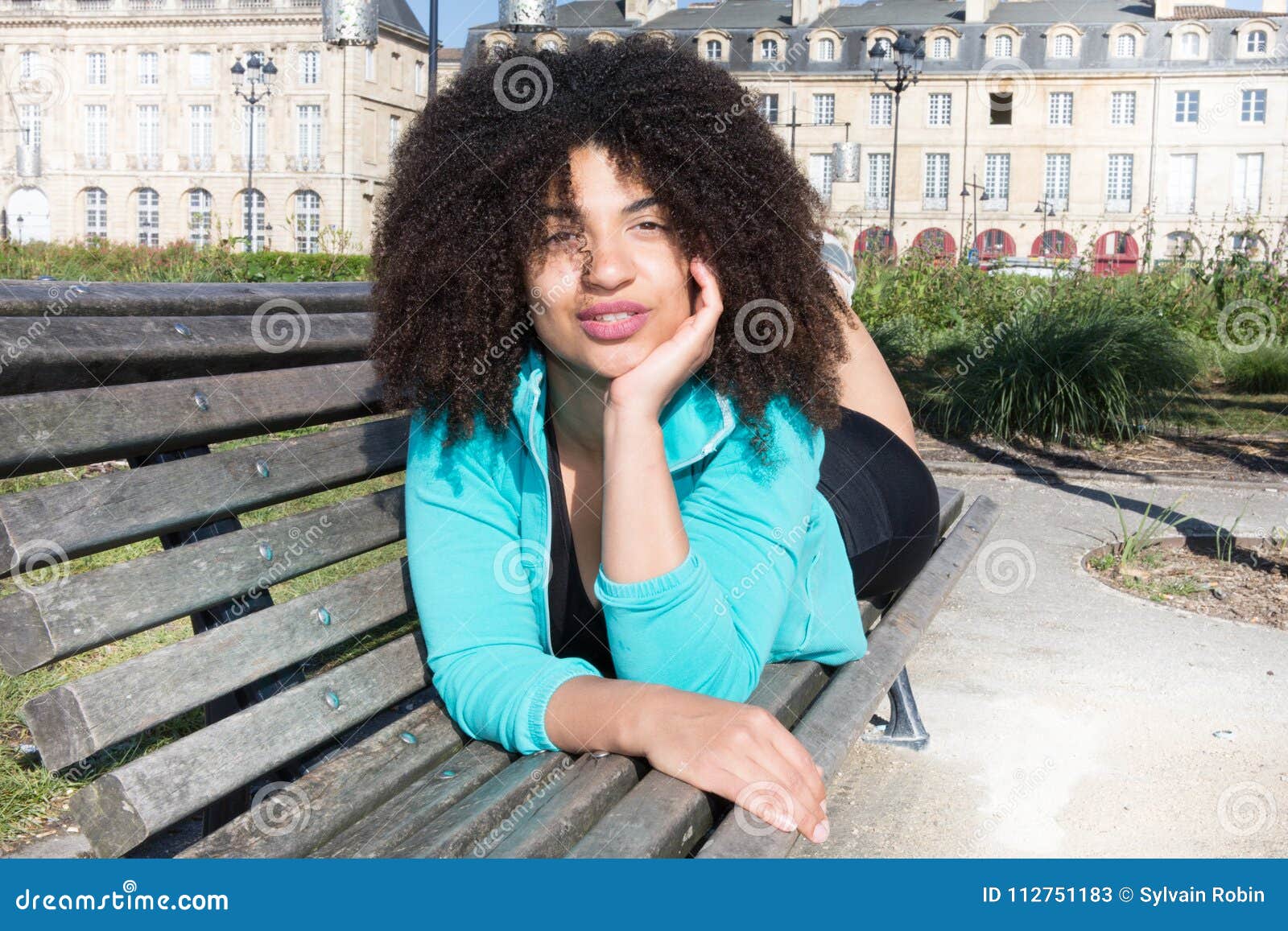 African American Female Model Lying in Bench Stock Image - Image of ...