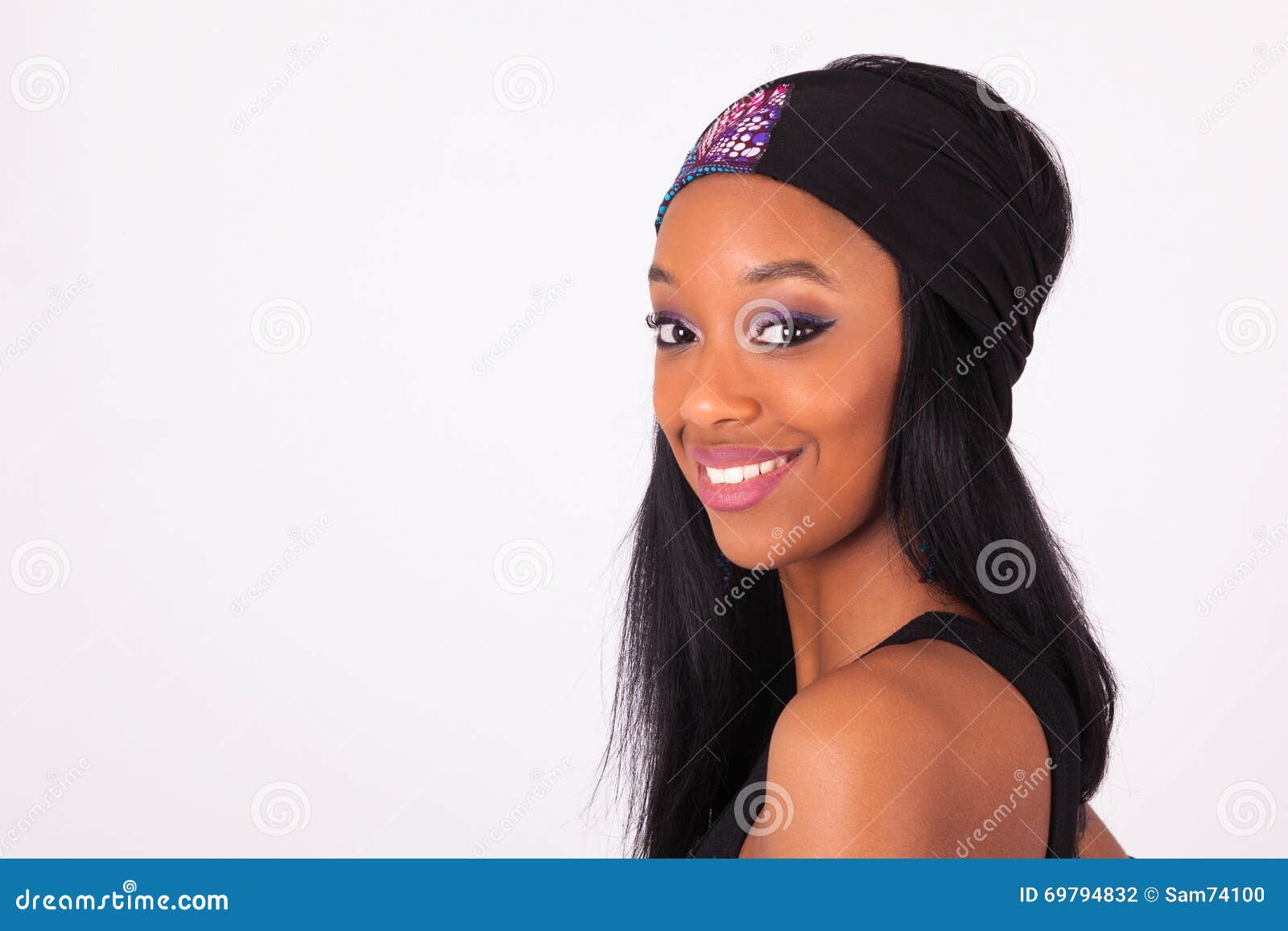 Beautiful African American Woman Wearing A Headband Isolated On Stock