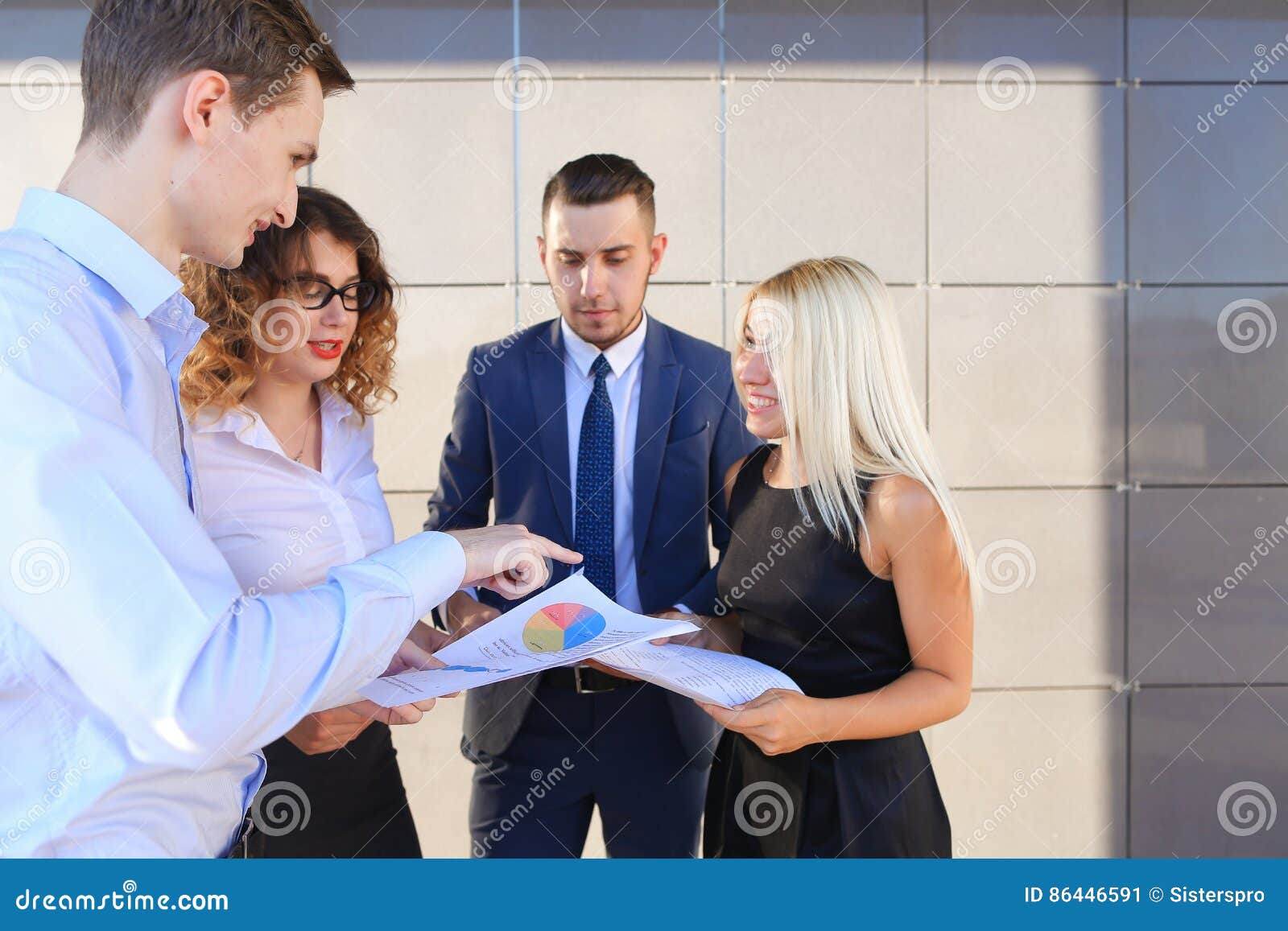 Beautiful Ambitious Young Men and Women Consider and Study Sched Stock ...