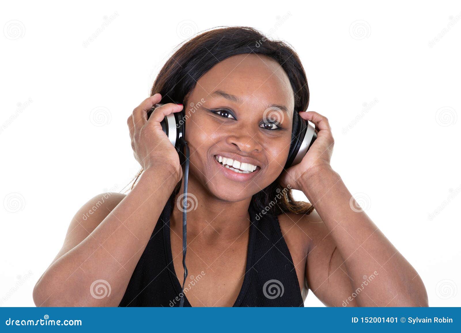 Beautiful American African Woman Listening Music Hands In Headphones