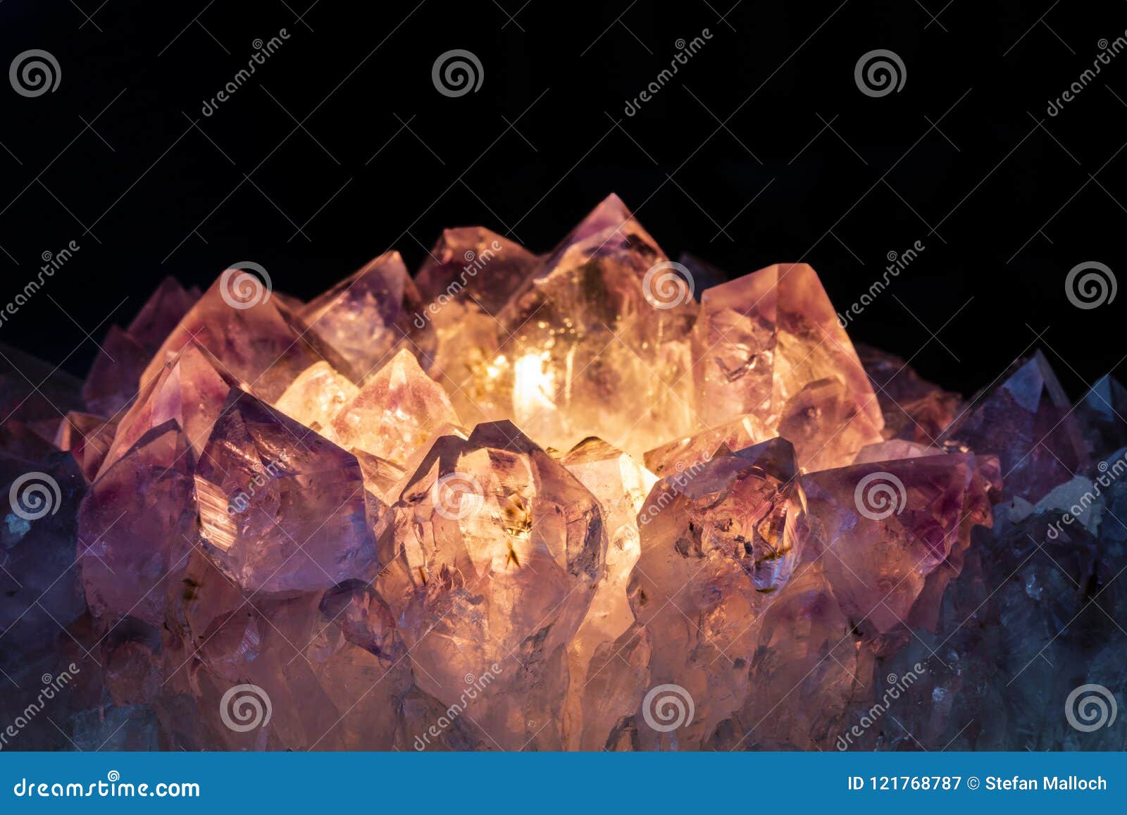 A Beautiful Amethyst Crystal Lit by Candle Light Stock Image - Image of ...