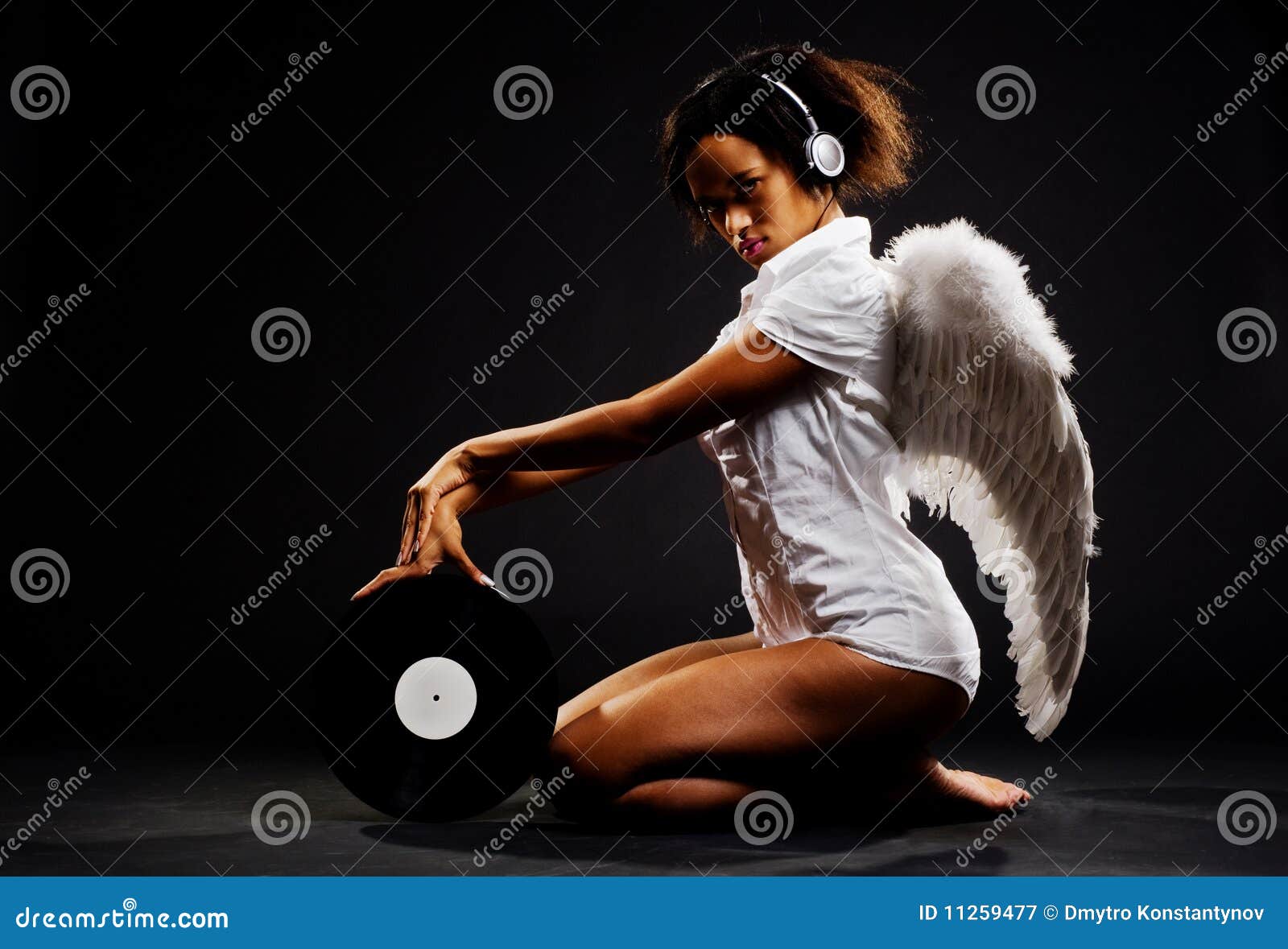 Beautiful angel with vinyl stock image. Image of music - 11259477