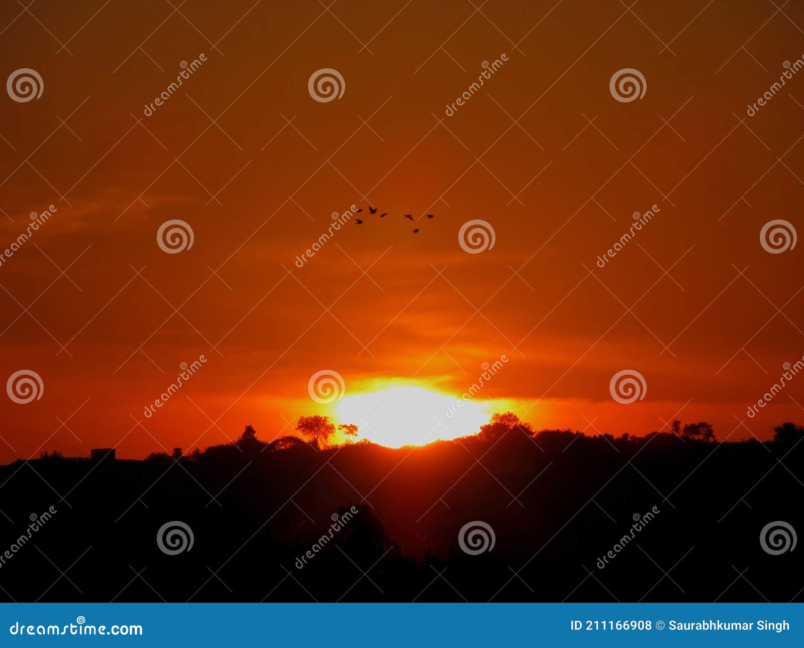 The Beautiful Appearance of Sun Rising Behind Clouds and Sun Rays ...