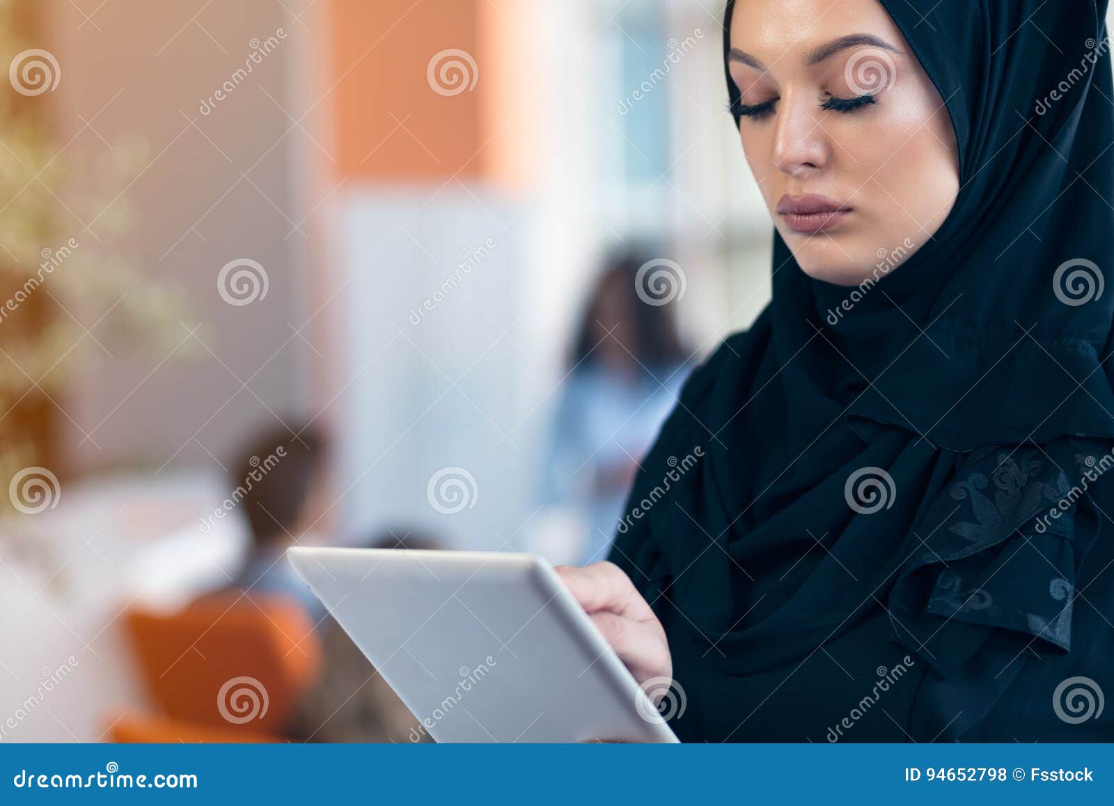 Beautiful Arabian Girl with Tablet Computer Working at Startup Office ...