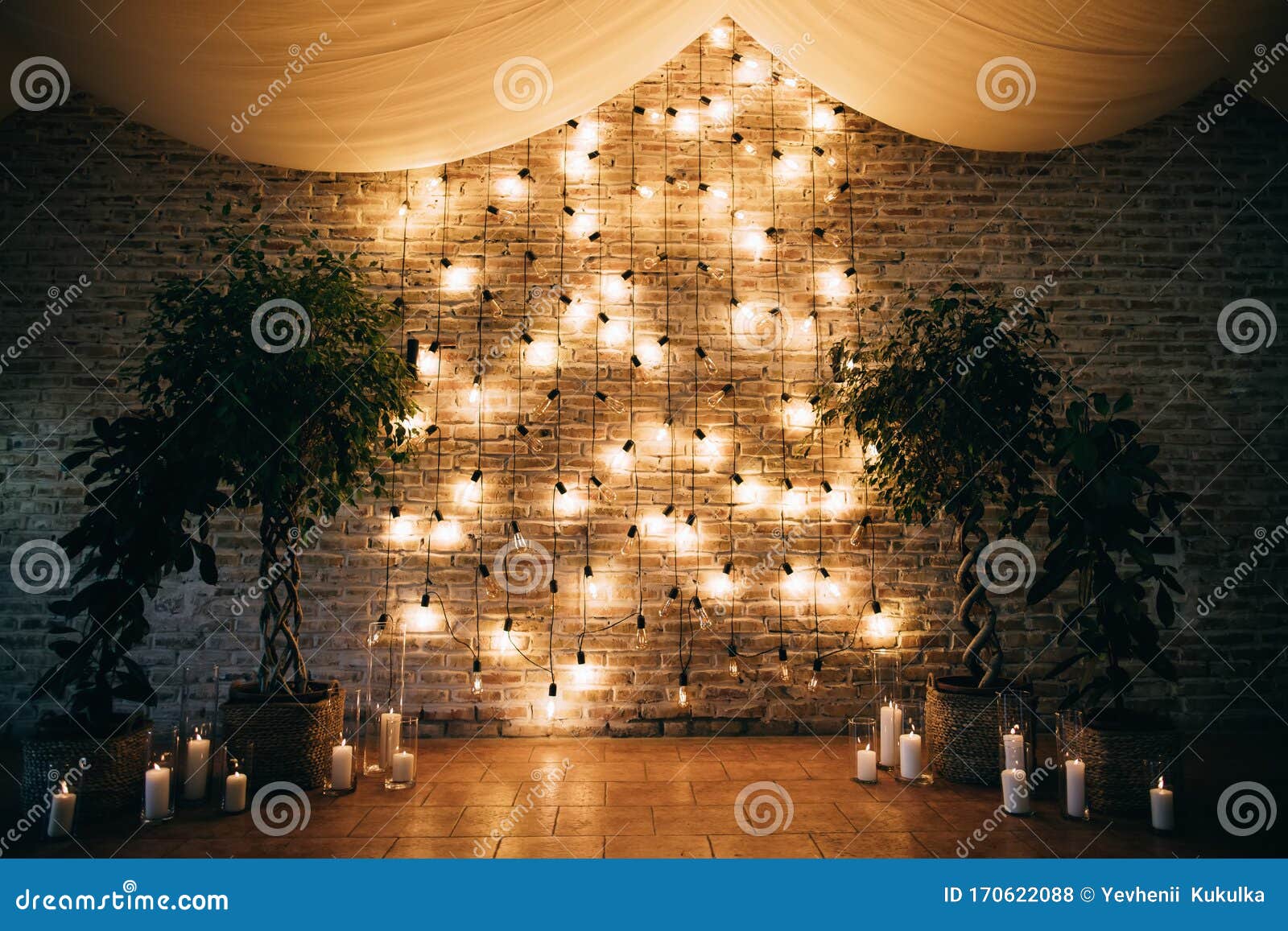 A Beautiful Arch for a Wedding Ceremony is Decorated with Lights Stock ...