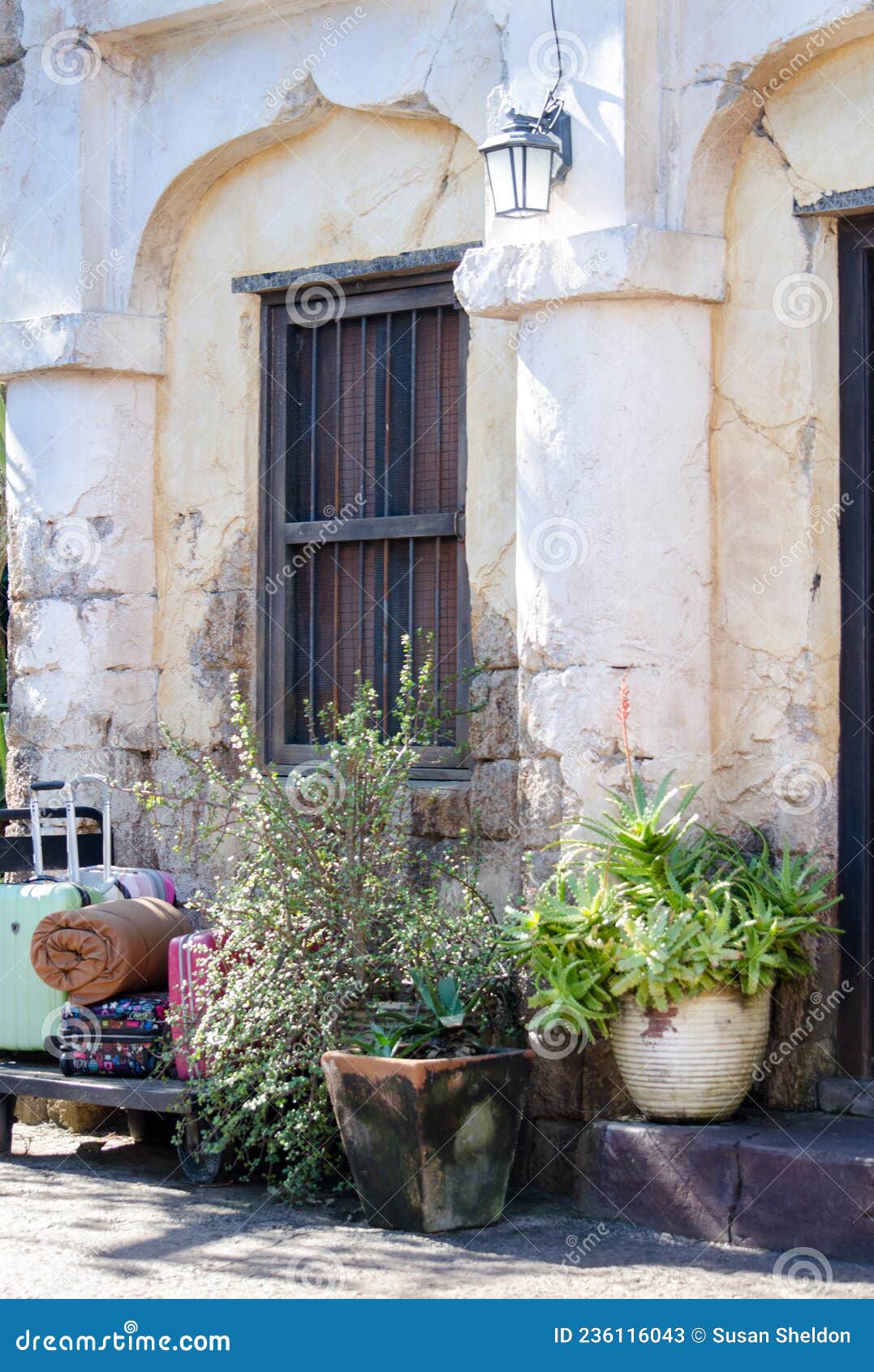 Beautiful Arched Windows on a Stucco Hotel Stock Image - Image of head ...