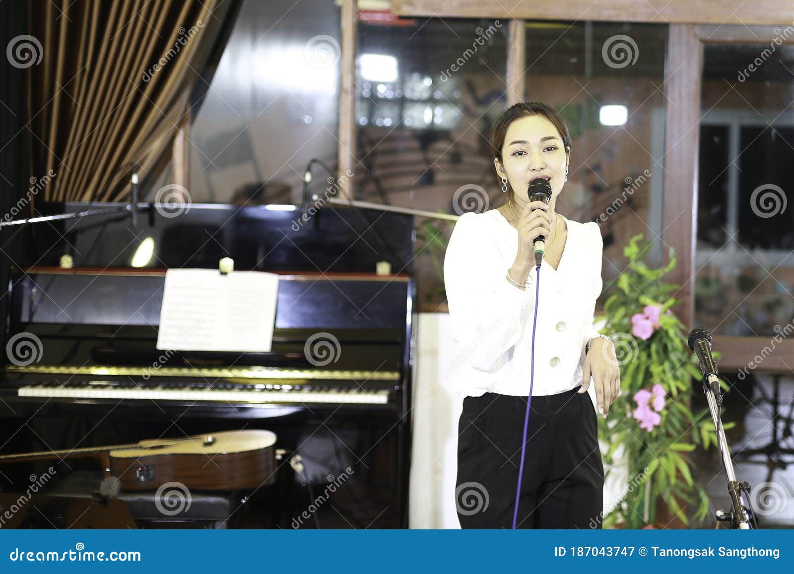 Asian Female Singer is Singing in the Studio Stock Image - Image of ...