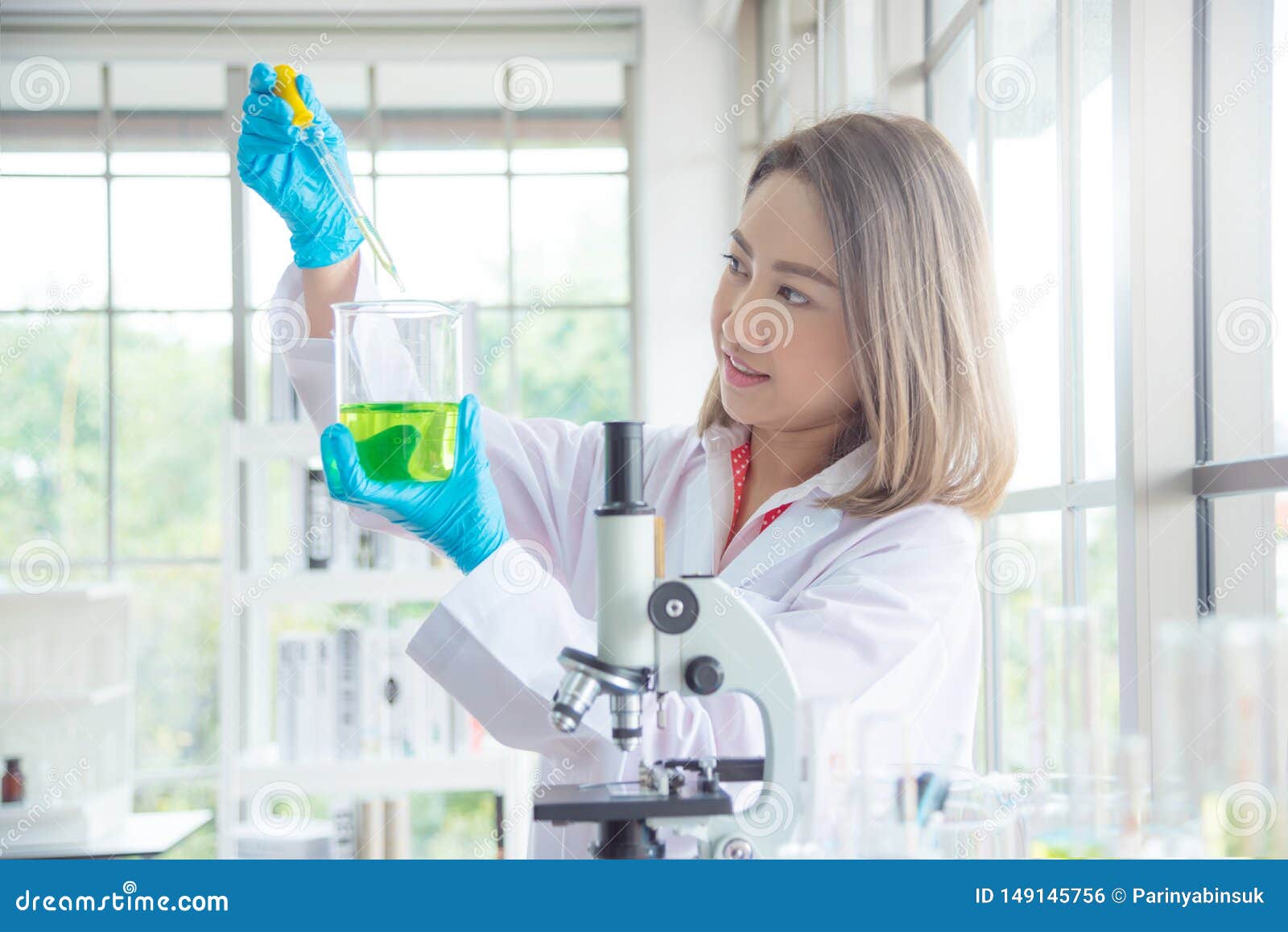 Scientist Doing Science Experiment in Laboratory Stock Photo - Image of ...