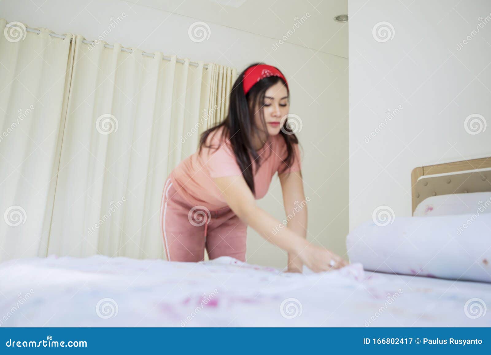 Beautiful Asian Woman Bowing while Making Bed Stock Image - Image of ...