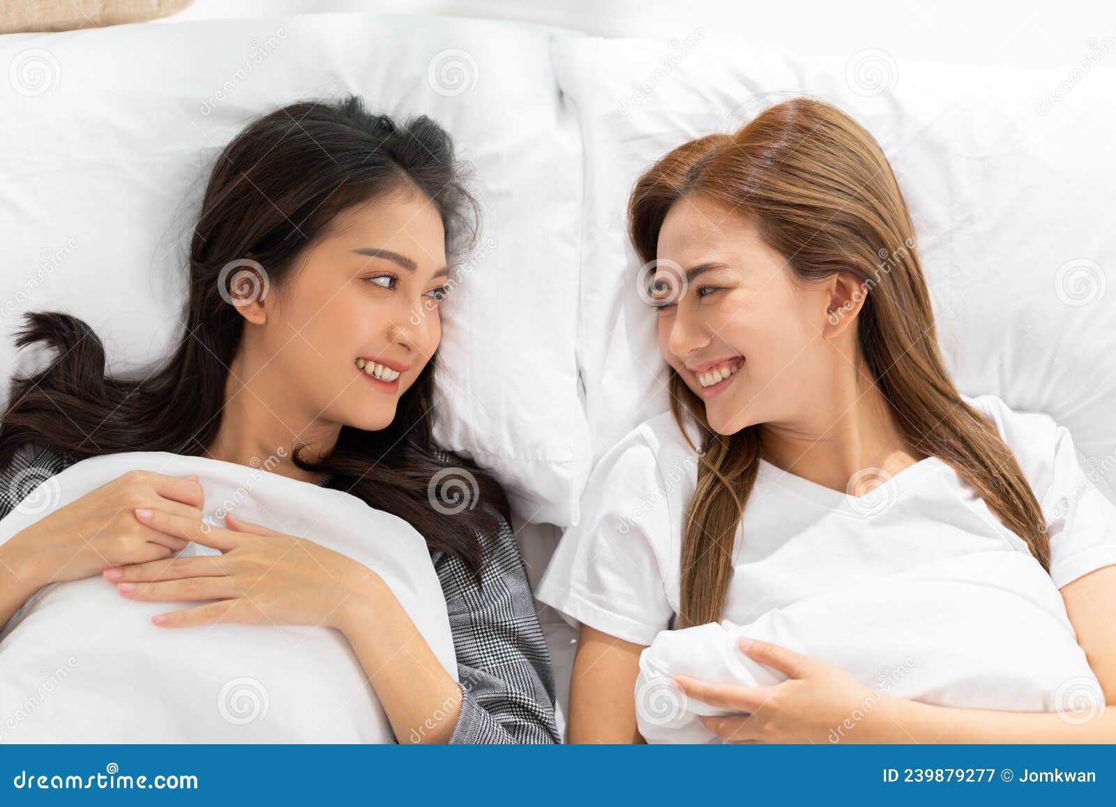 Beautiful Asian Young Lesbian Lgbtq Couple Or Friends Lying On Bed