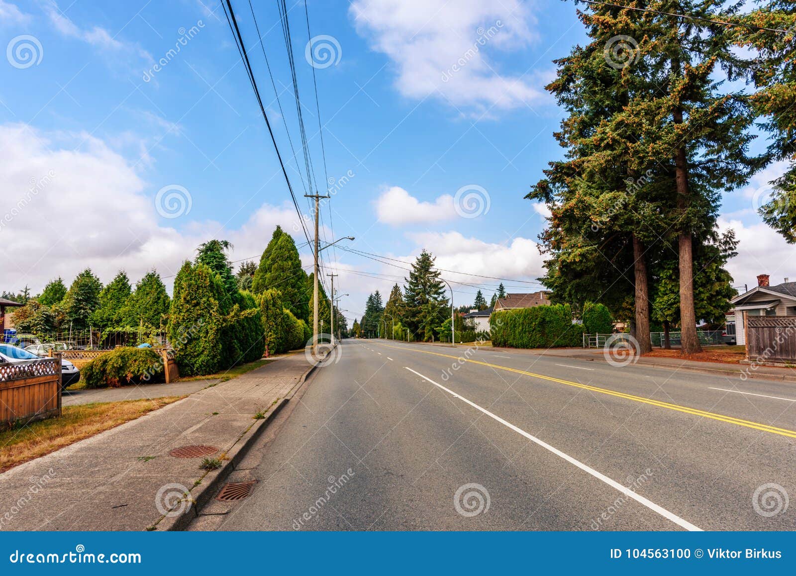 Beautiful Asphalt Road in the Suburbs with Beautiful Scenery Stock ...