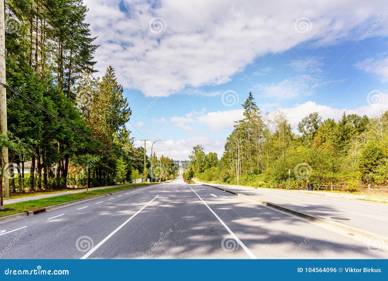 Beautiful Asphalt Road In The Suburbs With Beautiful Scenery Stock ...