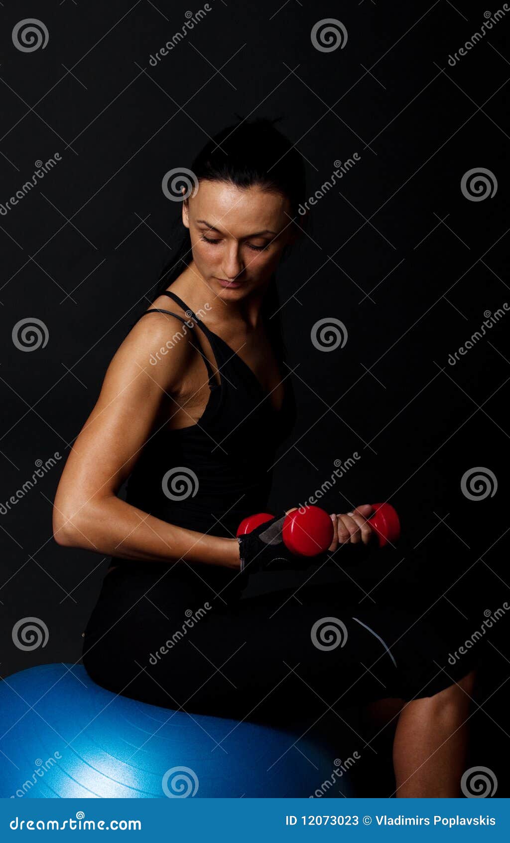 Beautiful Athlete Lifting Weights Stock Image - Image of isolated, dark ...