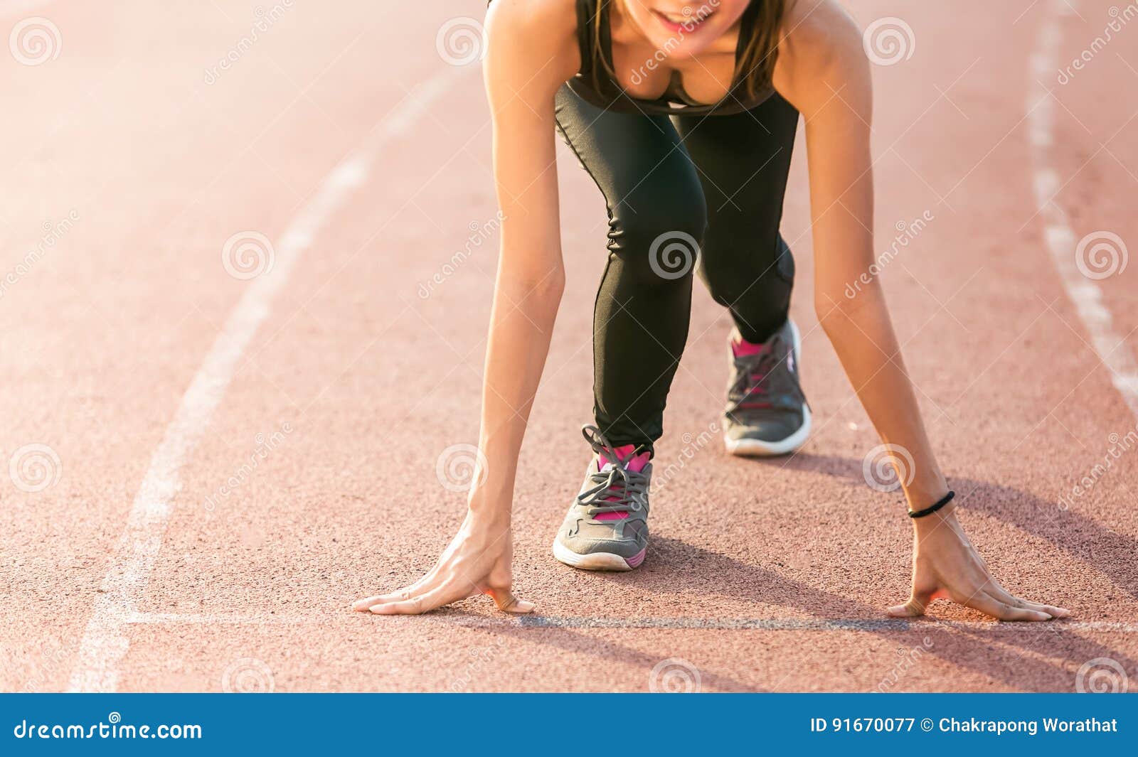 Beautiful Athlete on a Race Track is Ready To Run. Stock Image - Image ...