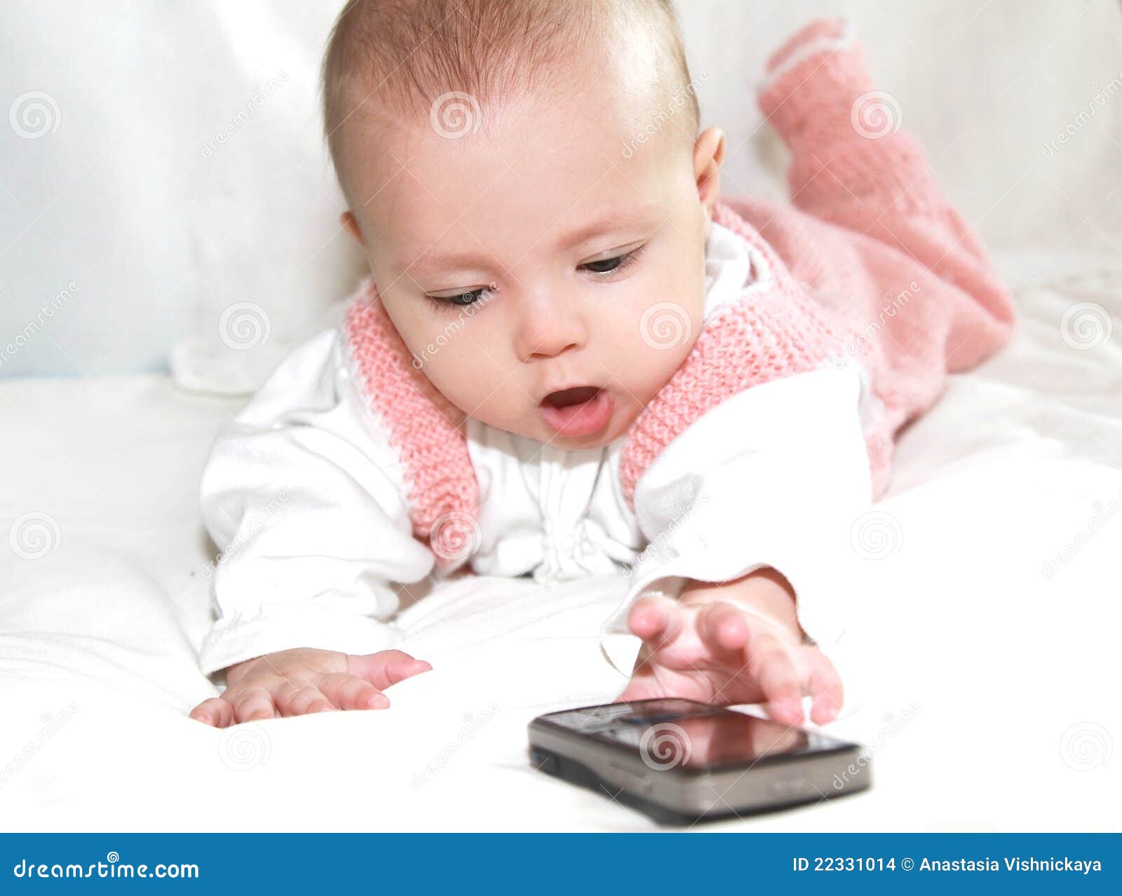 Beautiful Baby Girl Playing with Mobile Stock Photo - Image of beauty ...