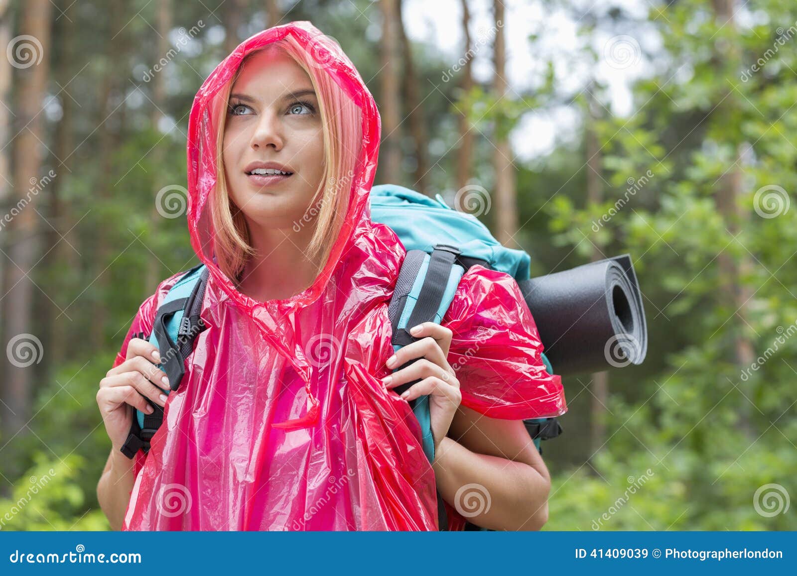 Beautiful Backpacker in Raincoat Looking Away at Forest Stock Image ...