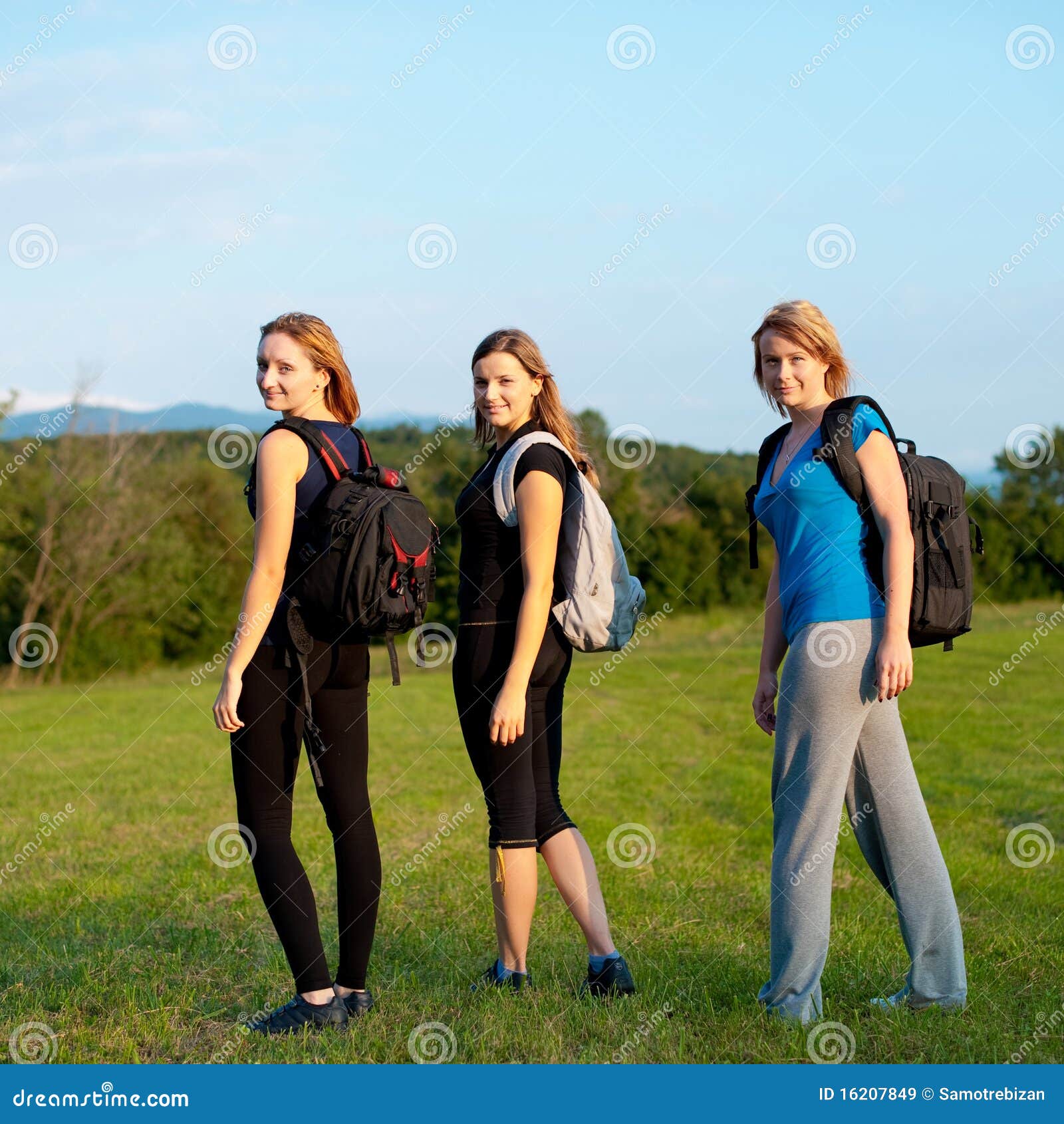 Beautiful backpackers stock image. Image of carrying - 16207849