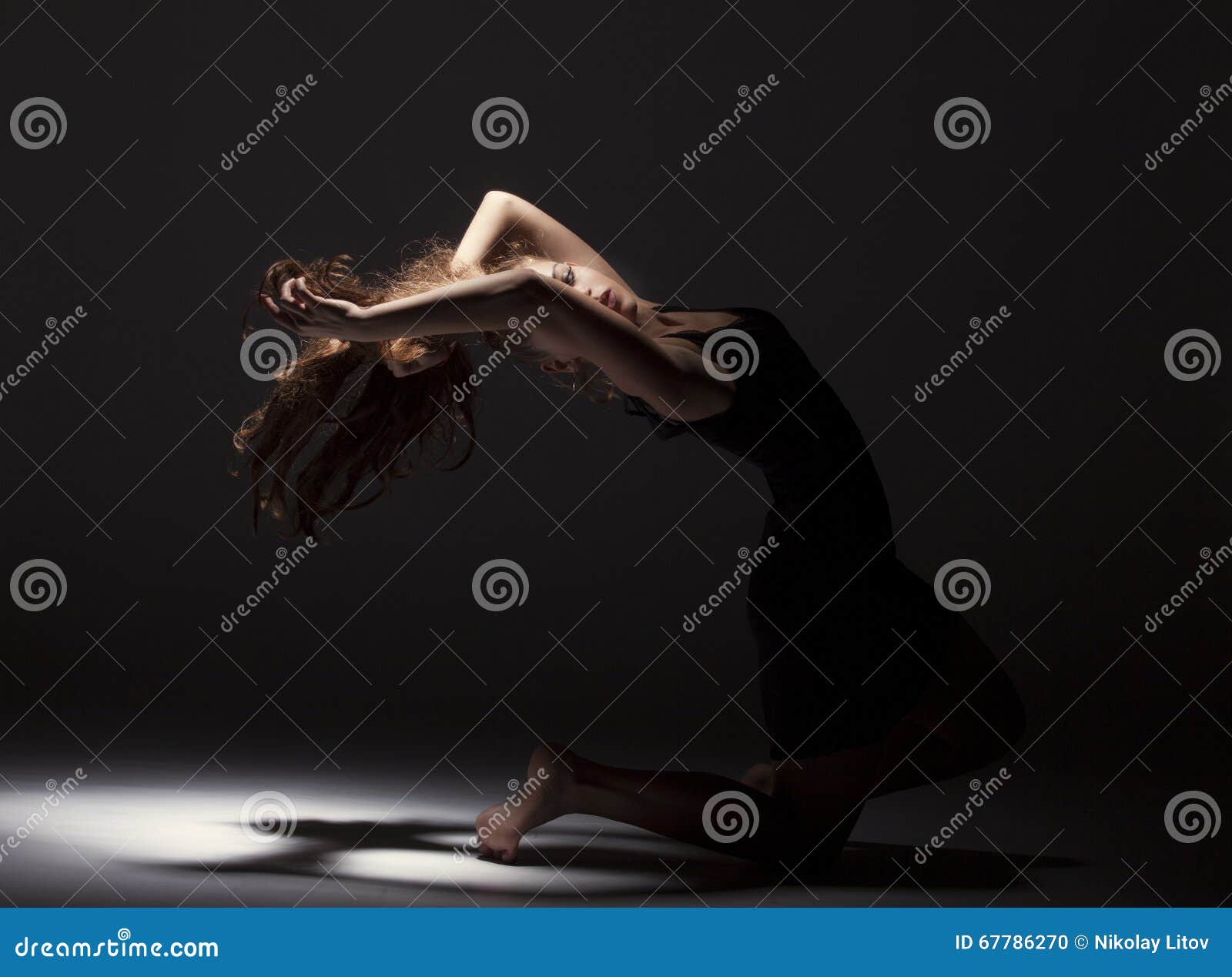 Modern Dancer Poses On Floor On Gray Background Royalty-Free Stock ...