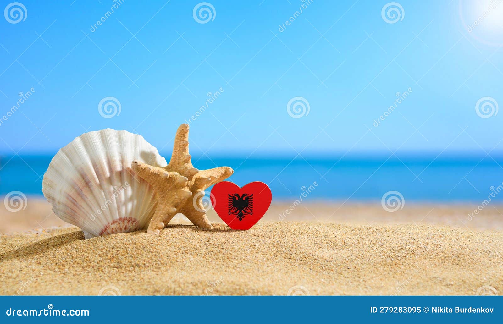 Flag of Albania in the Shape of a Heart and Shells on a Sandy Beach ...