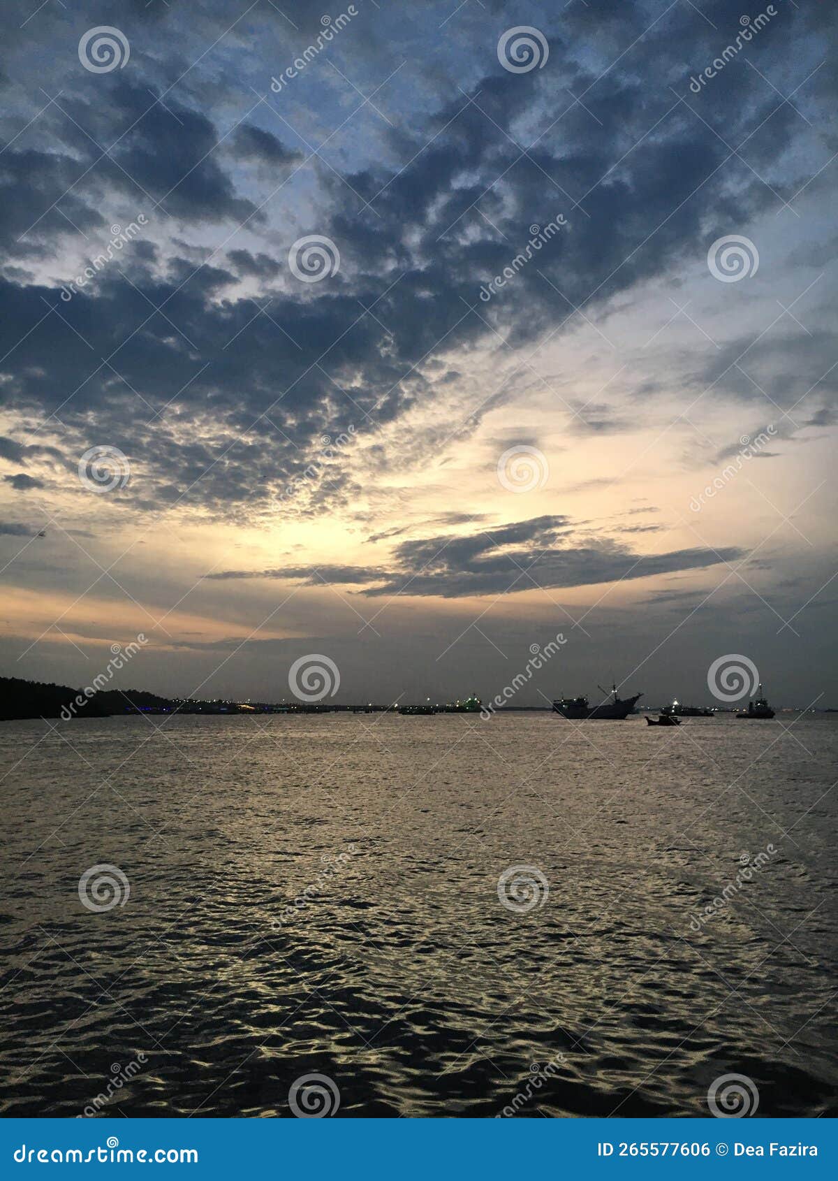Beautiful beach and clouds stock photo. Image of beach - 265577606
