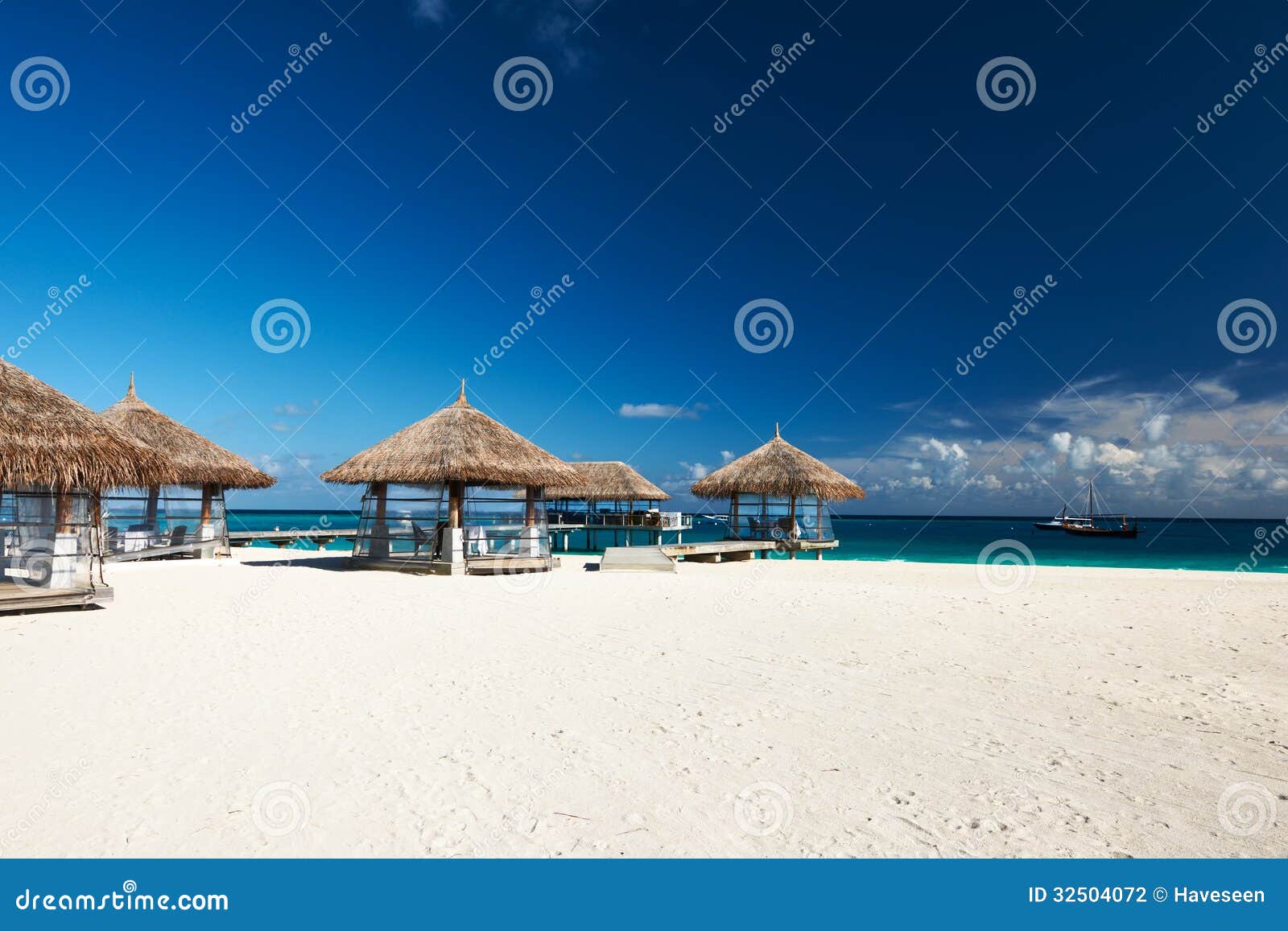 Beautiful beach with jetty stock photo. Image of coastline - 32504072