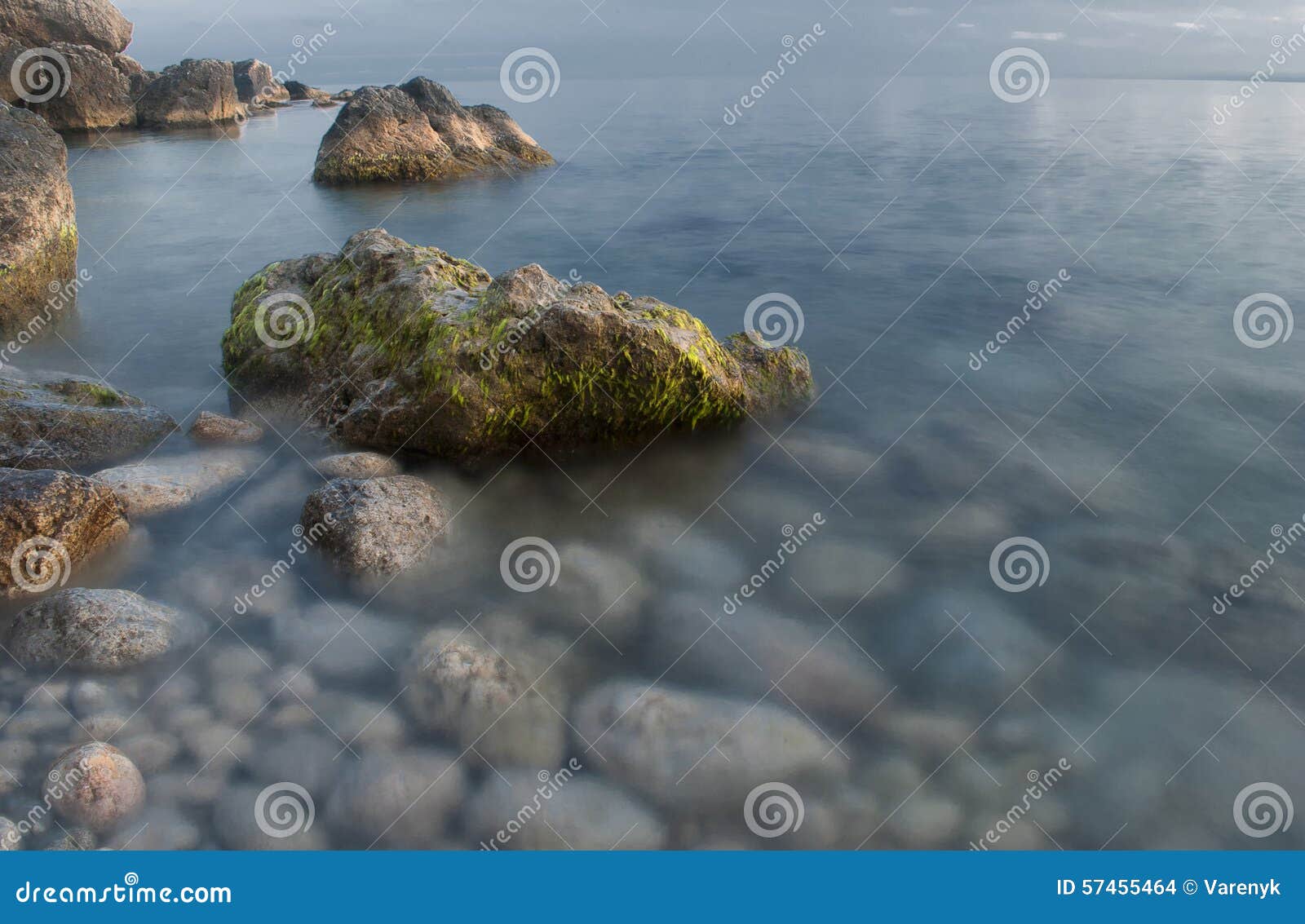 Beautiful Beach with Mossy Rocks Stock Photo - Image of beauty, black ...