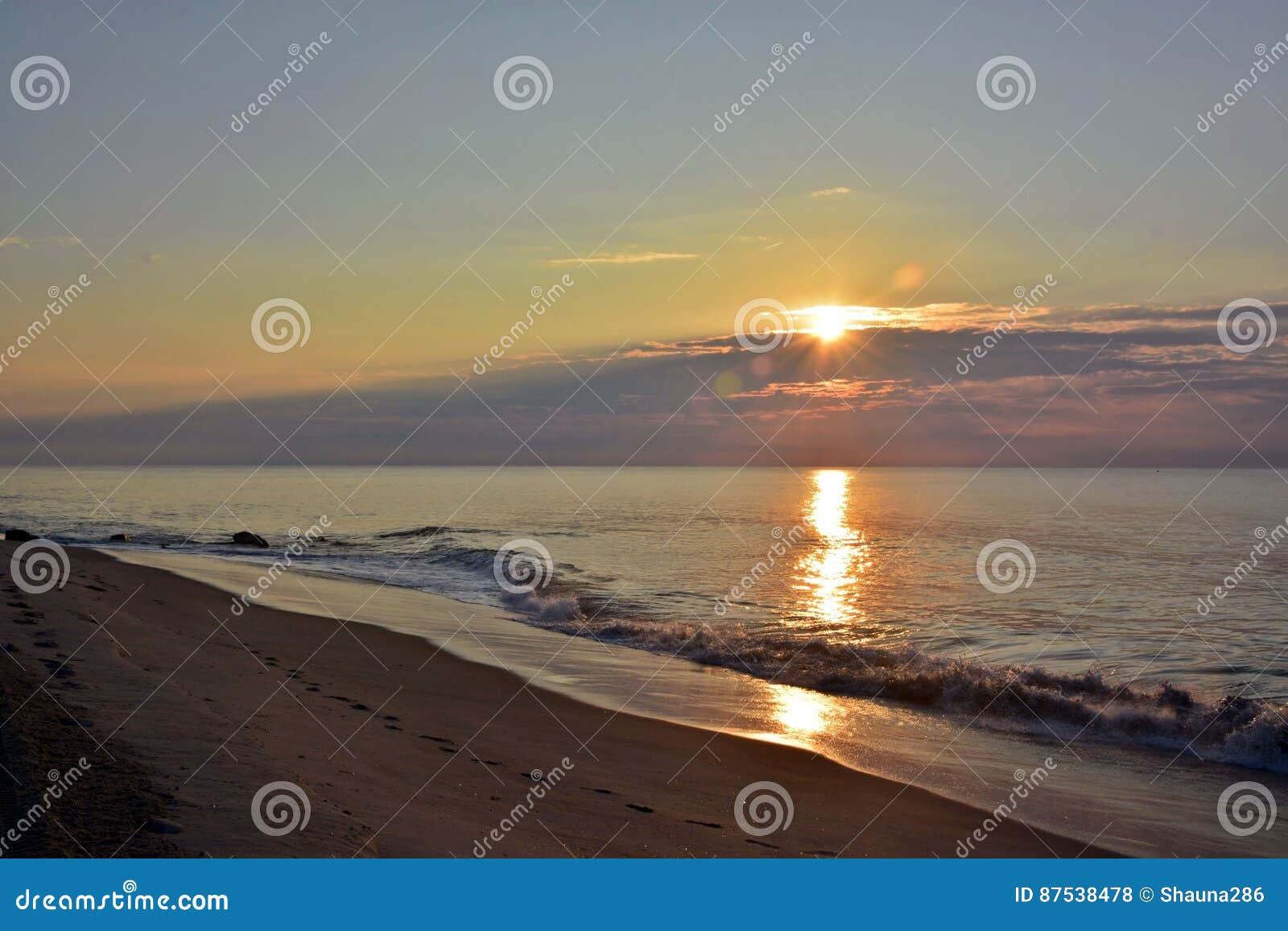Beautiful Beach Sunrise stock photo. Image of glowing - 87538478