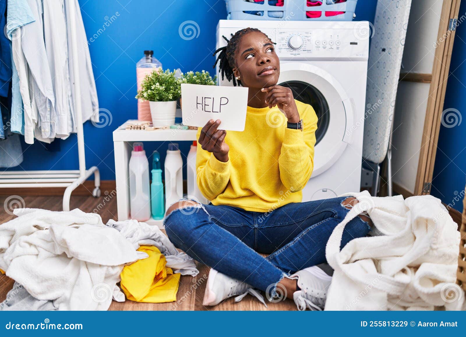 Beautiful Black Woman Doing Laundry Asking for Help Serious Face ...