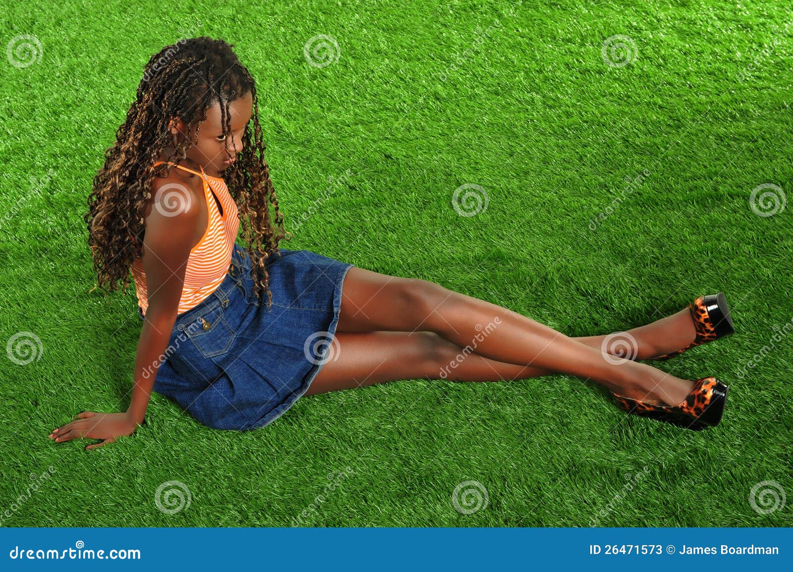 A Beautiful Black Woman Sitting on Grass Stock Image - Image of female ...