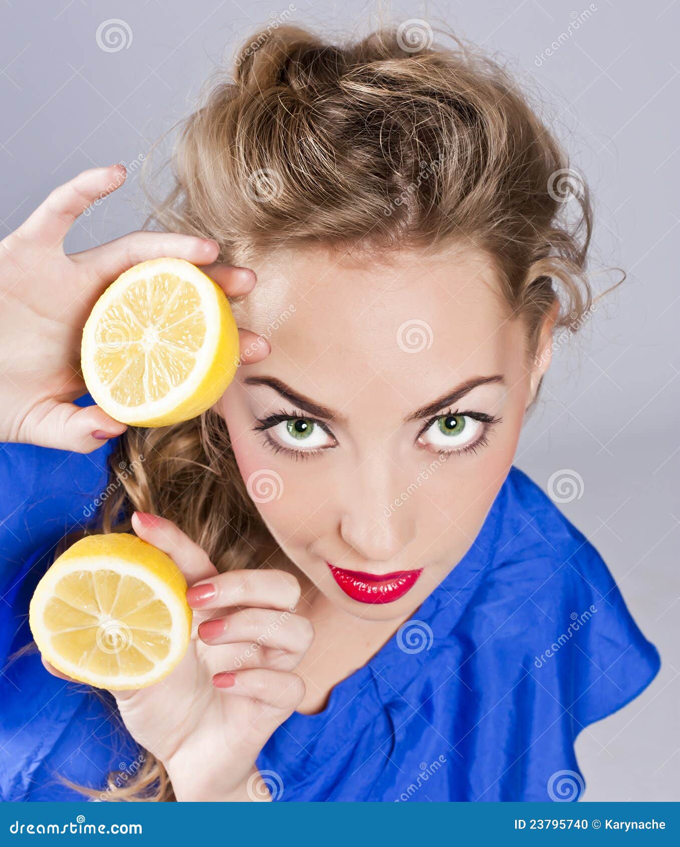Beautiful blond with lemon stock photo. Image of person - 23795740