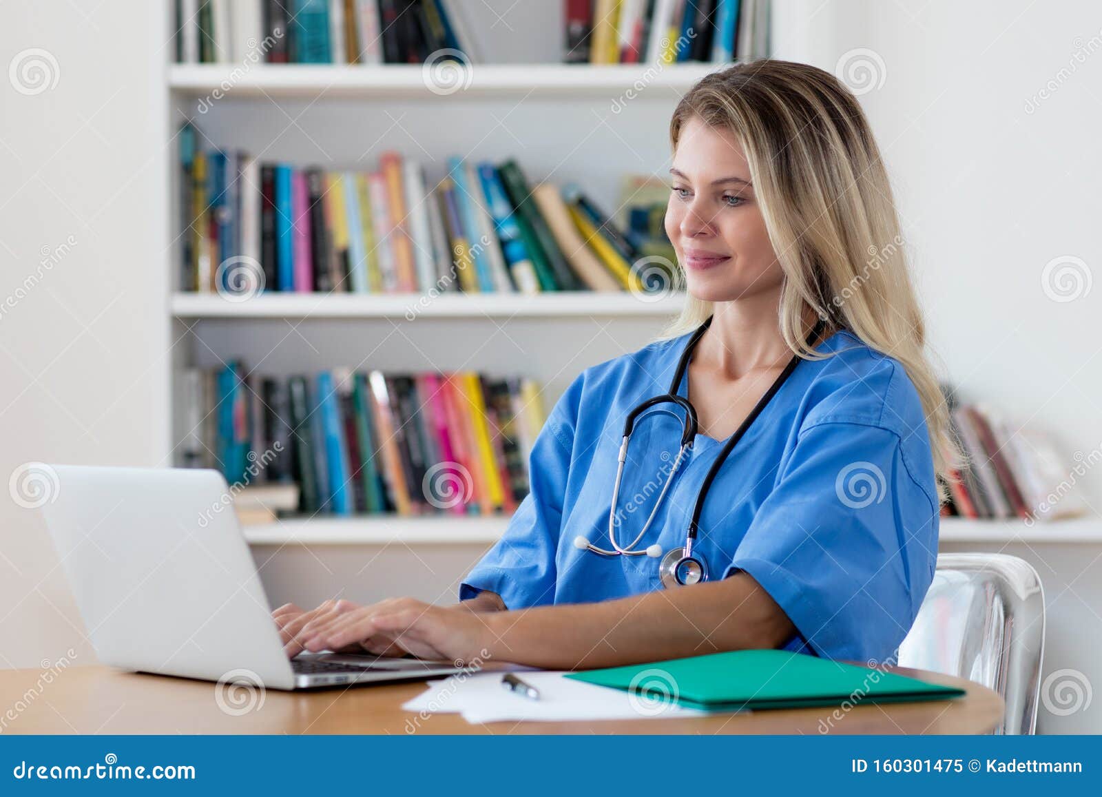 Beautiful Blond Nurse Working at Computer Stock Image - Image of ...