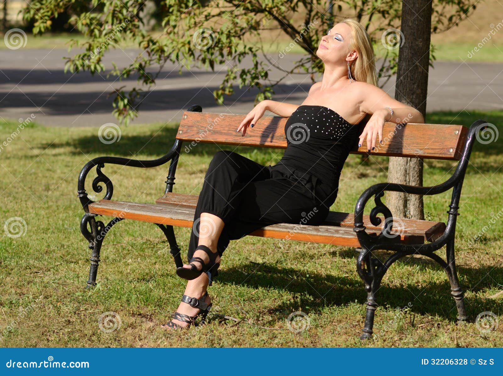 Beautiful Blond Woman Sunbathing Stock Photo - Image of beautiful ...