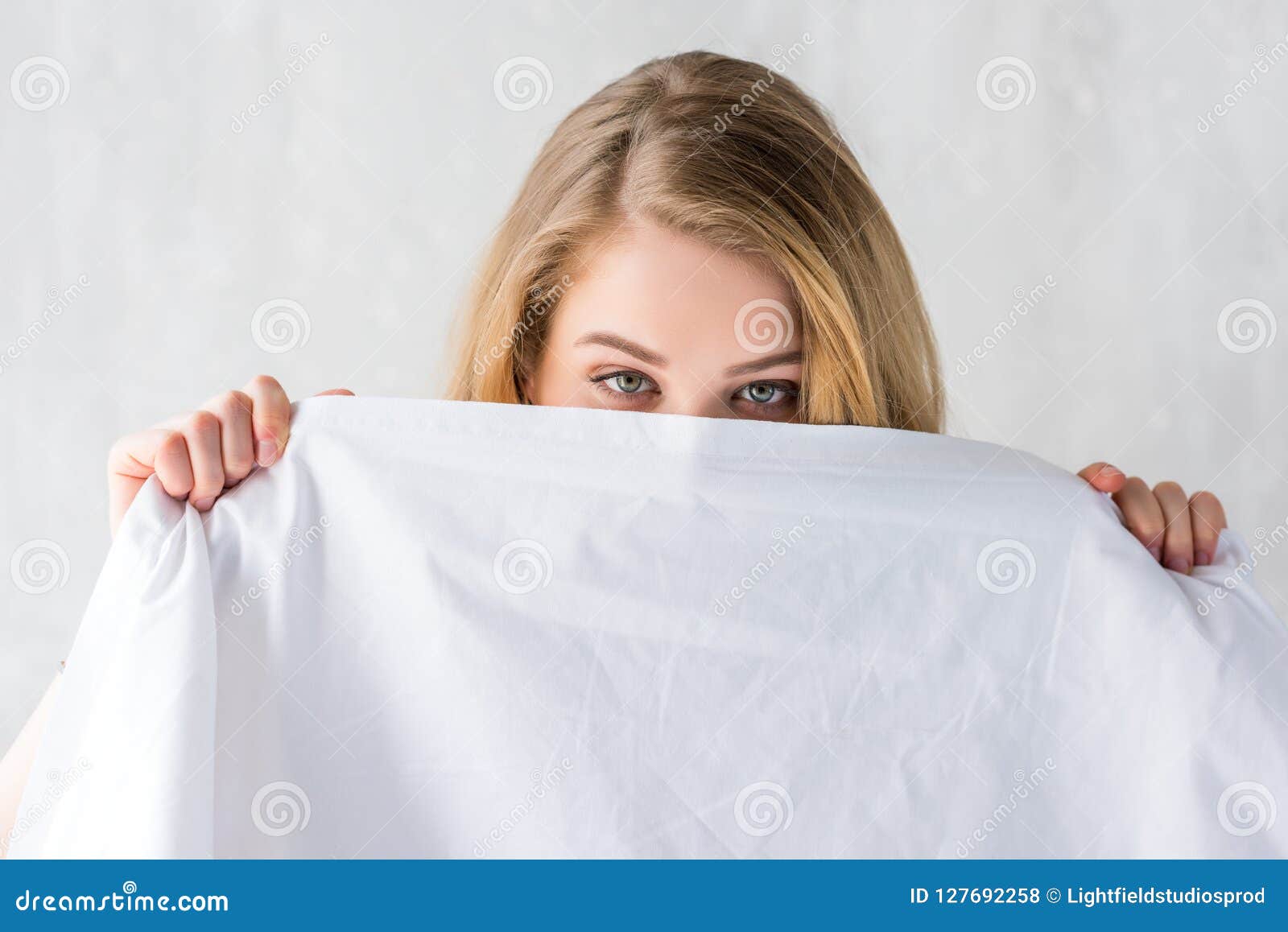 Beautiful Blonde Girl Hiding Stock Photo - Image of youngadult, person ...