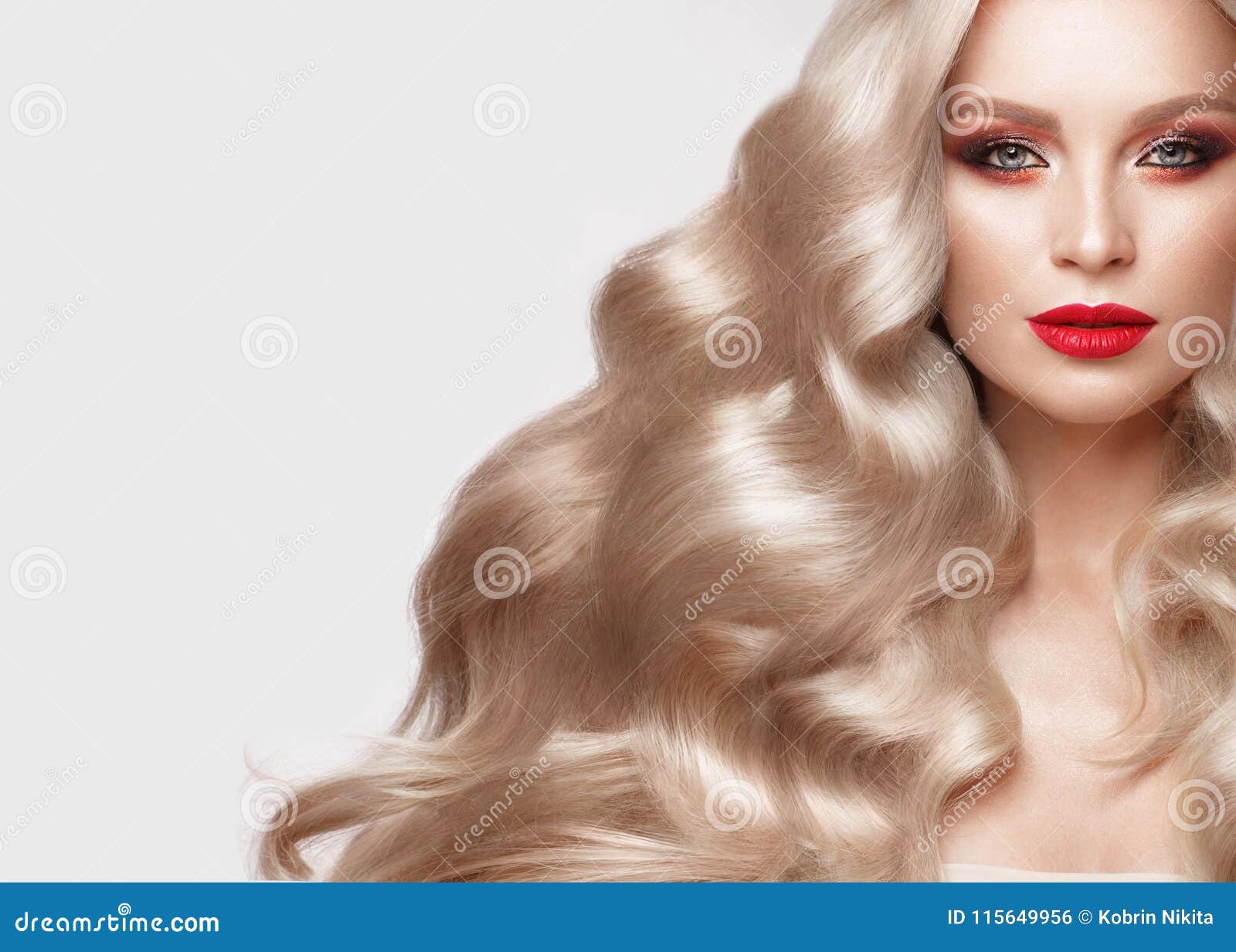 Beautiful Blonde In A Hollywood Manner With Curls Natural Makeup And