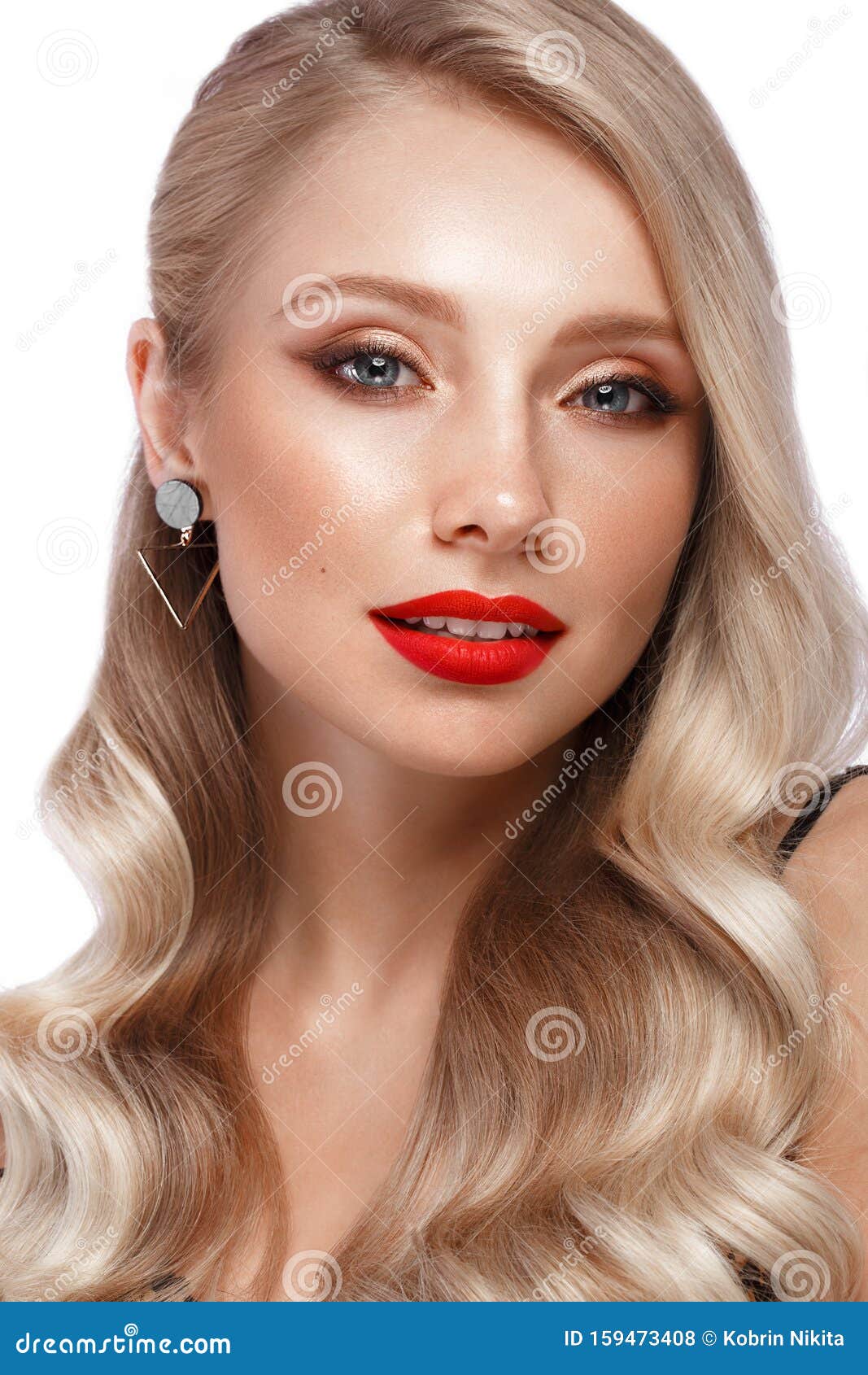 Beautiful Blonde In A Hollywood Manner With Curls Natural Makeup And