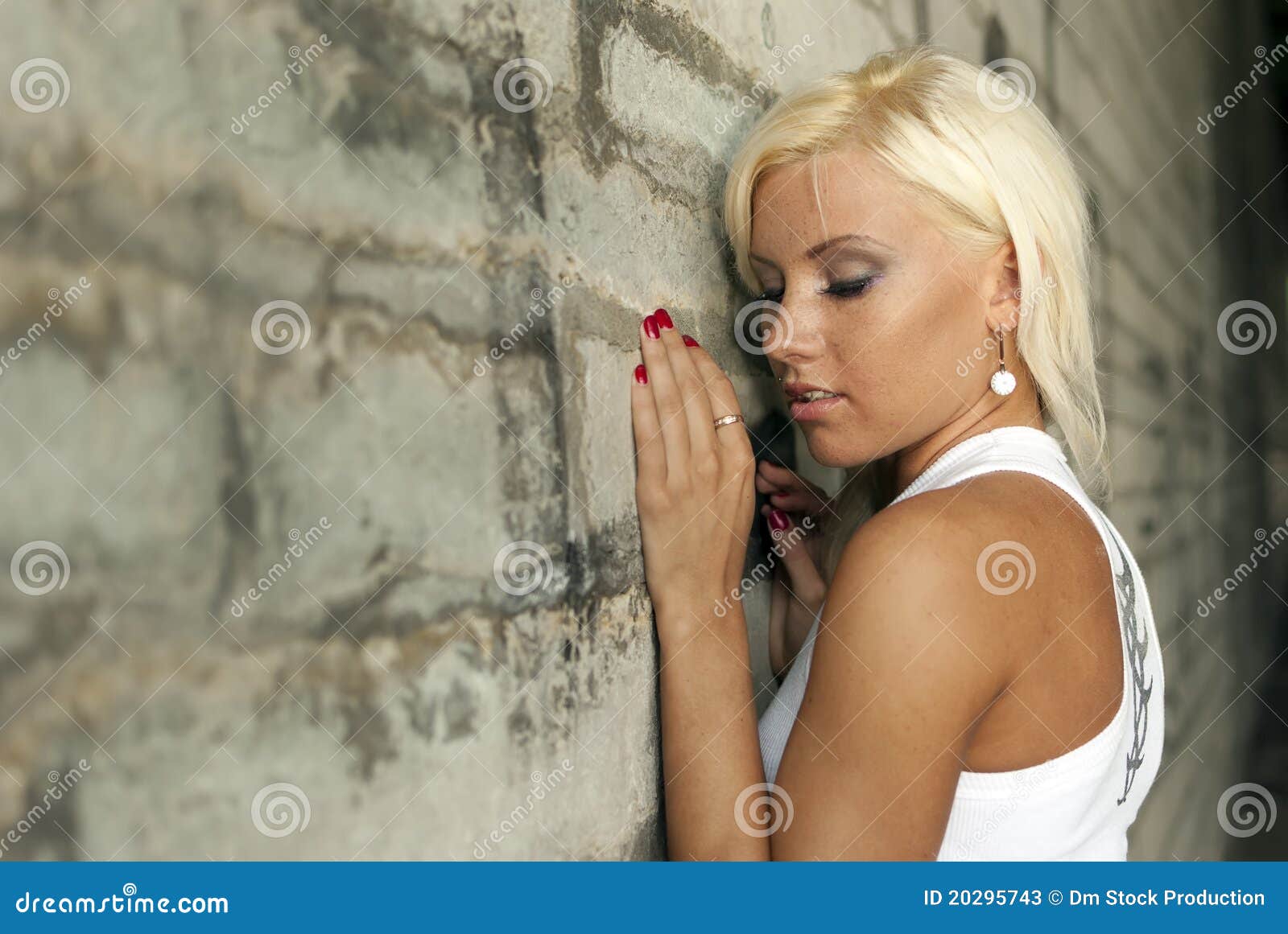 Beautiful Blonde Posing by the Wall Stock Image - Image of female ...