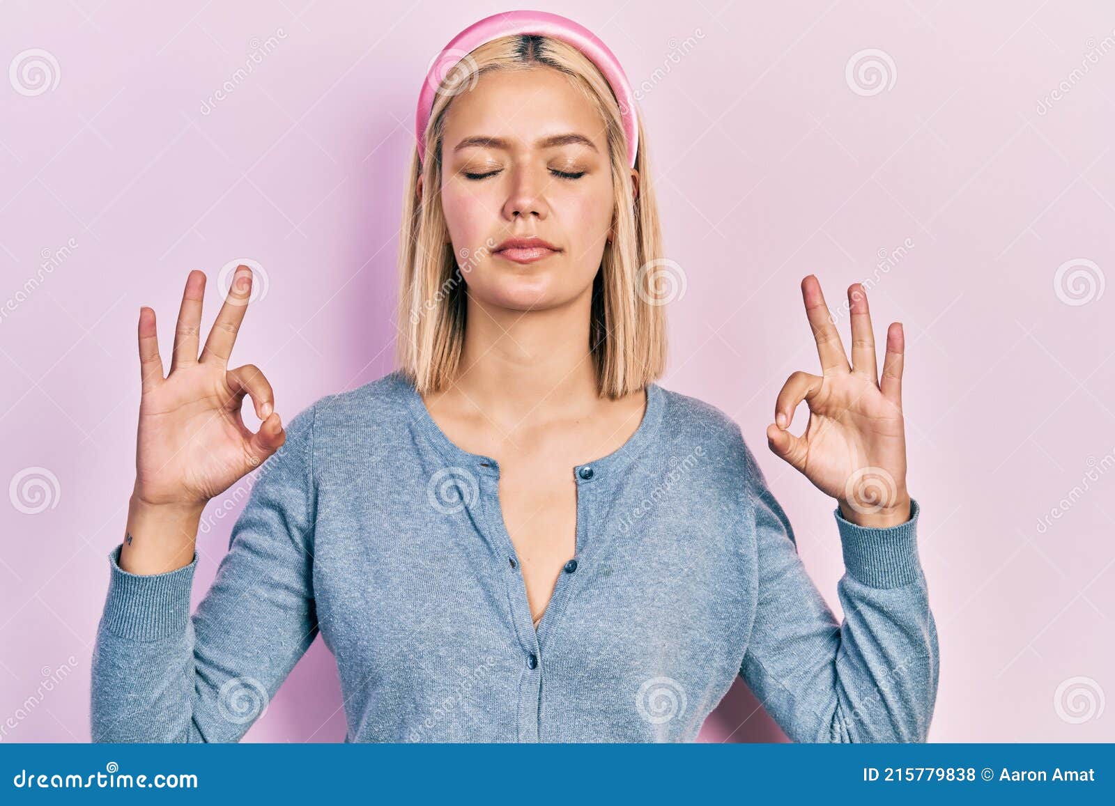 Beautiful Blonde Woman Standing Over Pink Background Relax And Smiling