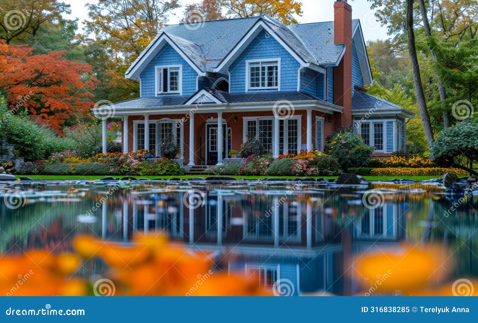Beautiful Blue House with Pond in the Front Yard Stock Image - Image of ...