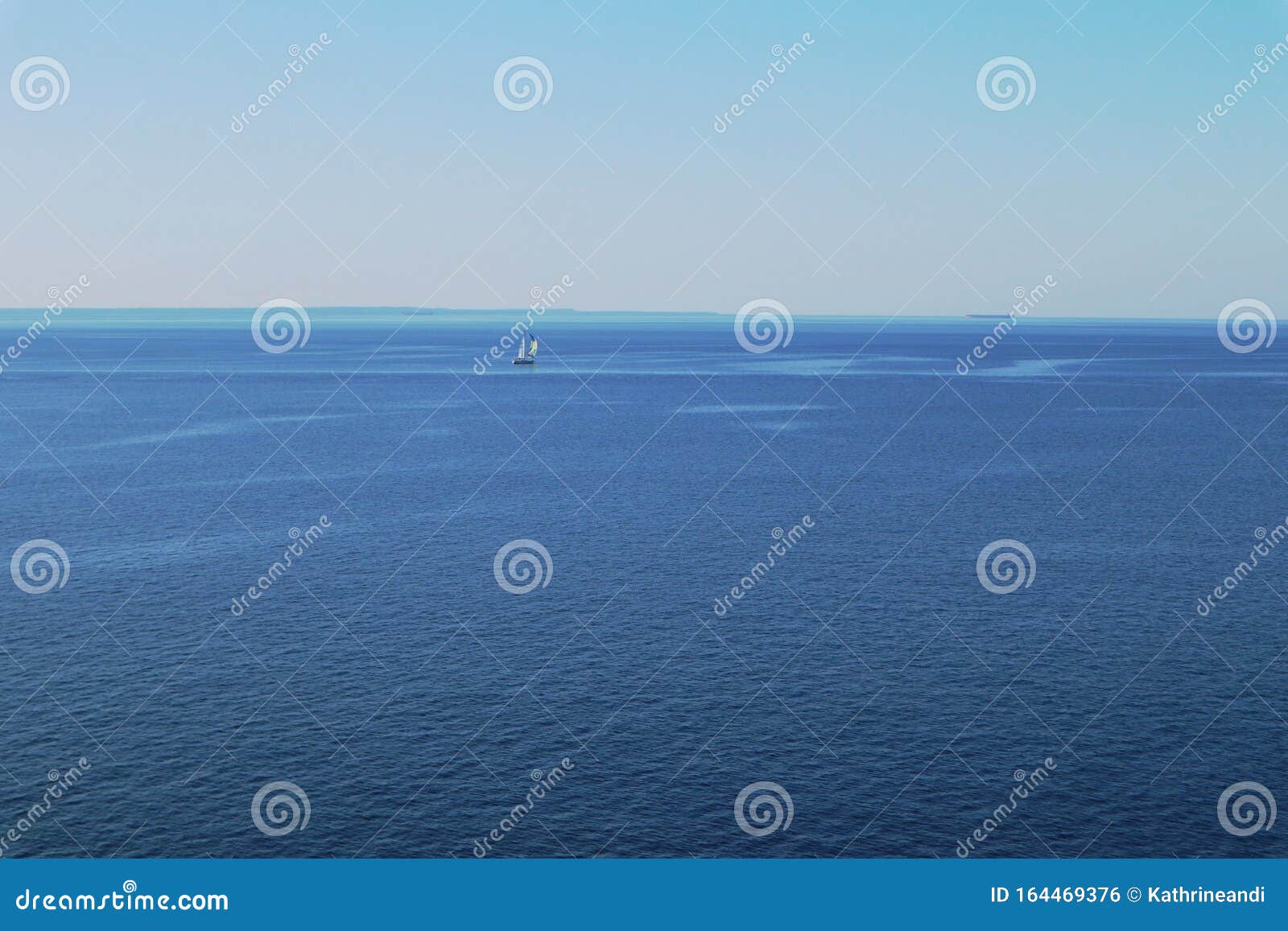 Beautiful Blue Sea Scape View with Small Boat and Clear Sky Stock Photo ...