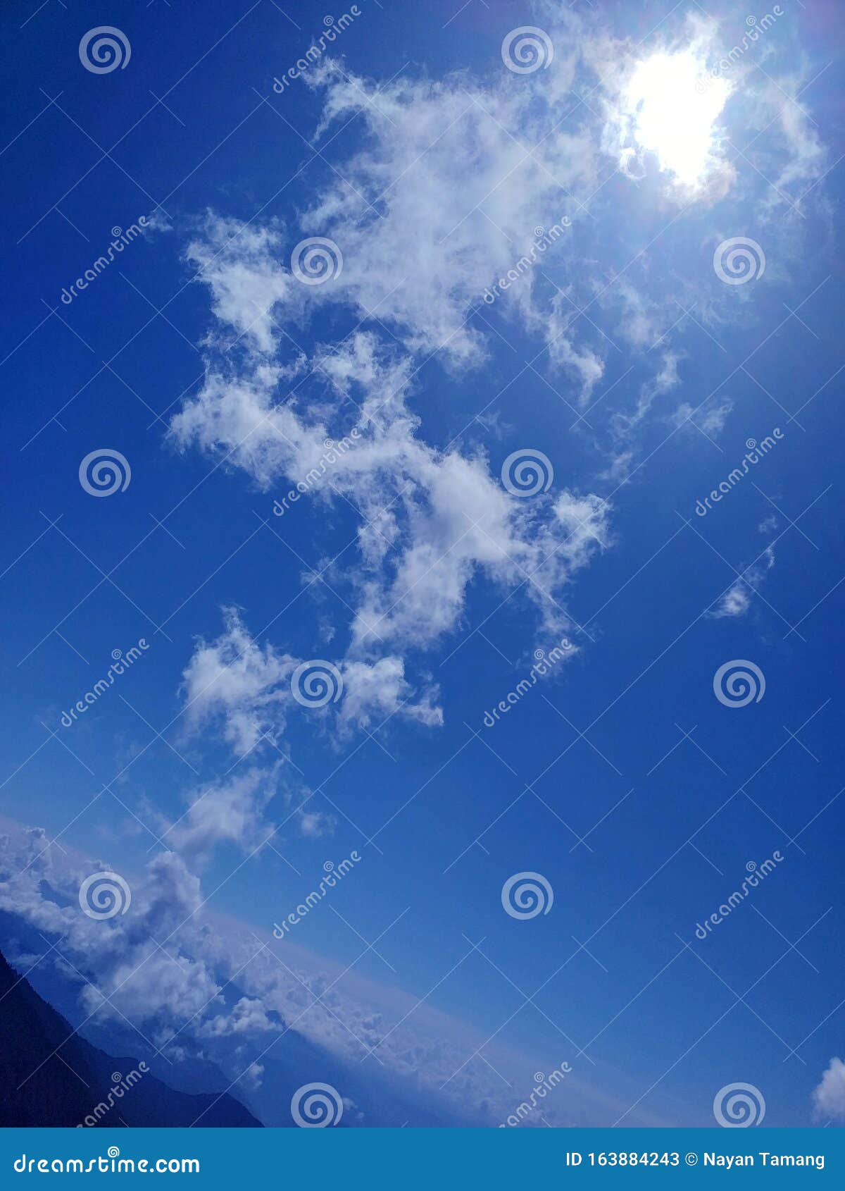 Beautiful Blue and White Sky with Bluer Sun Stock Image - Image of blue ...