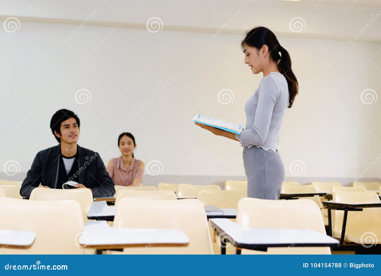Beautiful Bookworm Reading in Classroom Stock Photo - Image of face ...